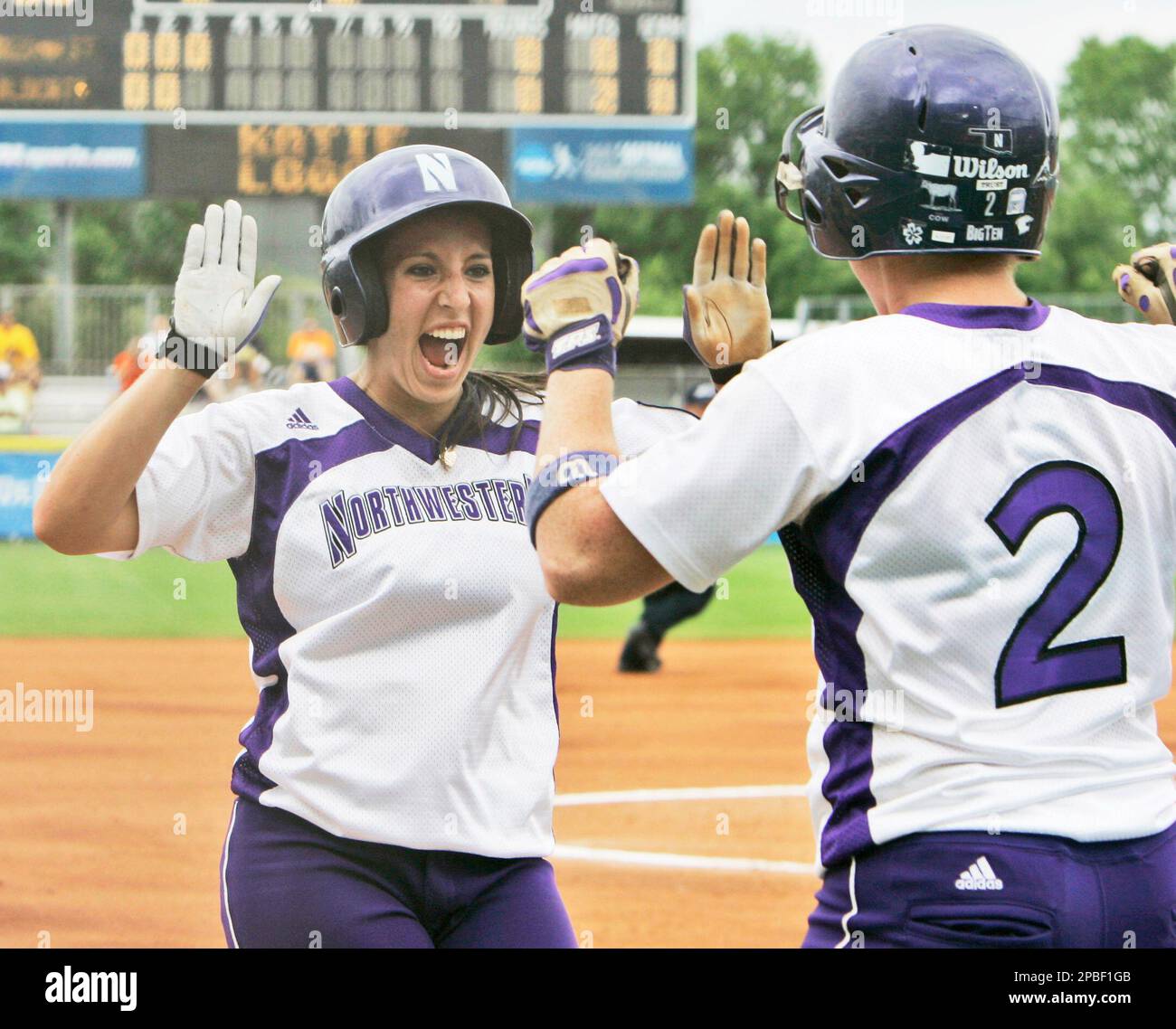 Northwestern's Kelly Dyer, left, celebrates with teammate Tammy ...