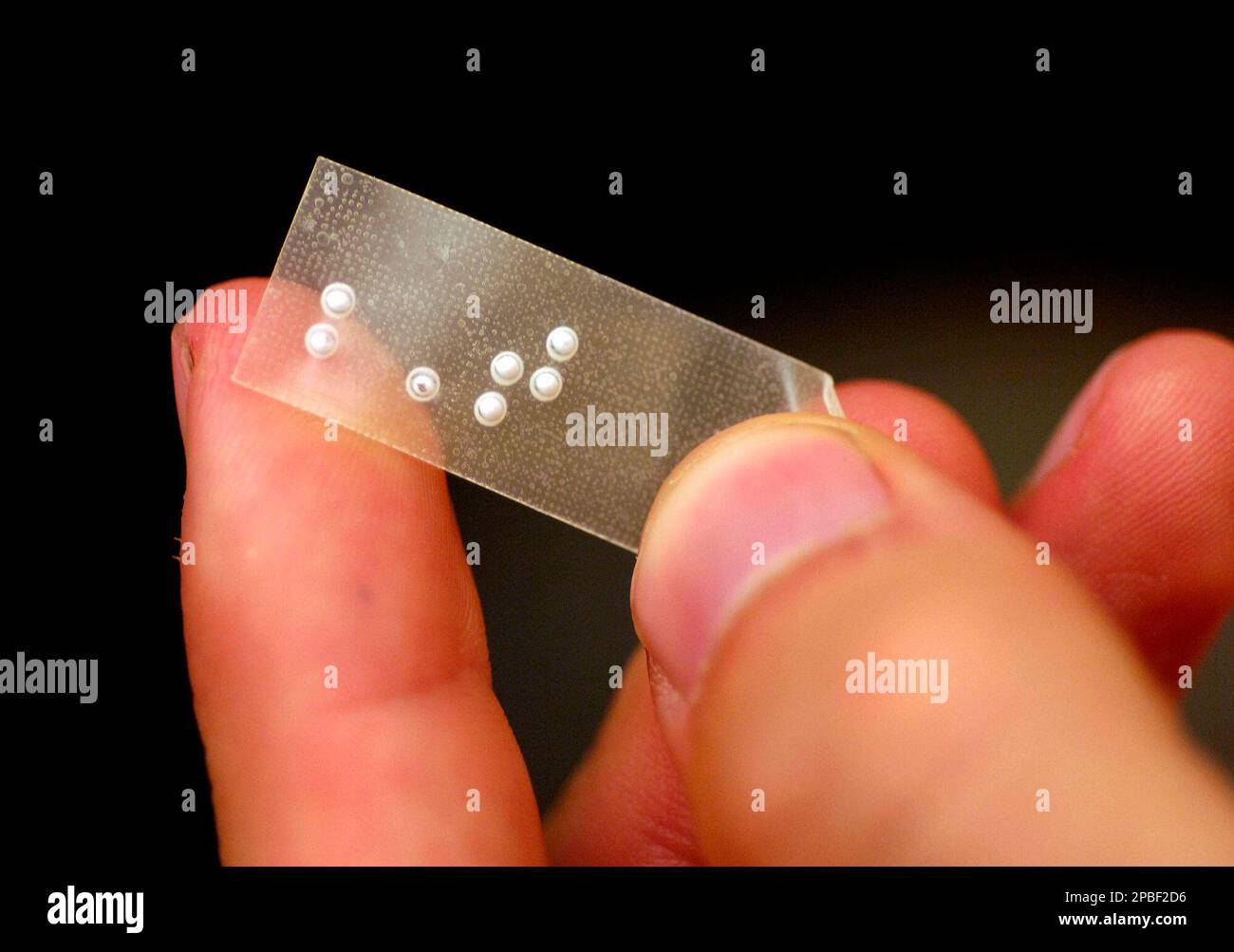 ** ADVANCE FOR SUNDAY, JUNE 3 **A Braille tape that reads "tab" is made ...