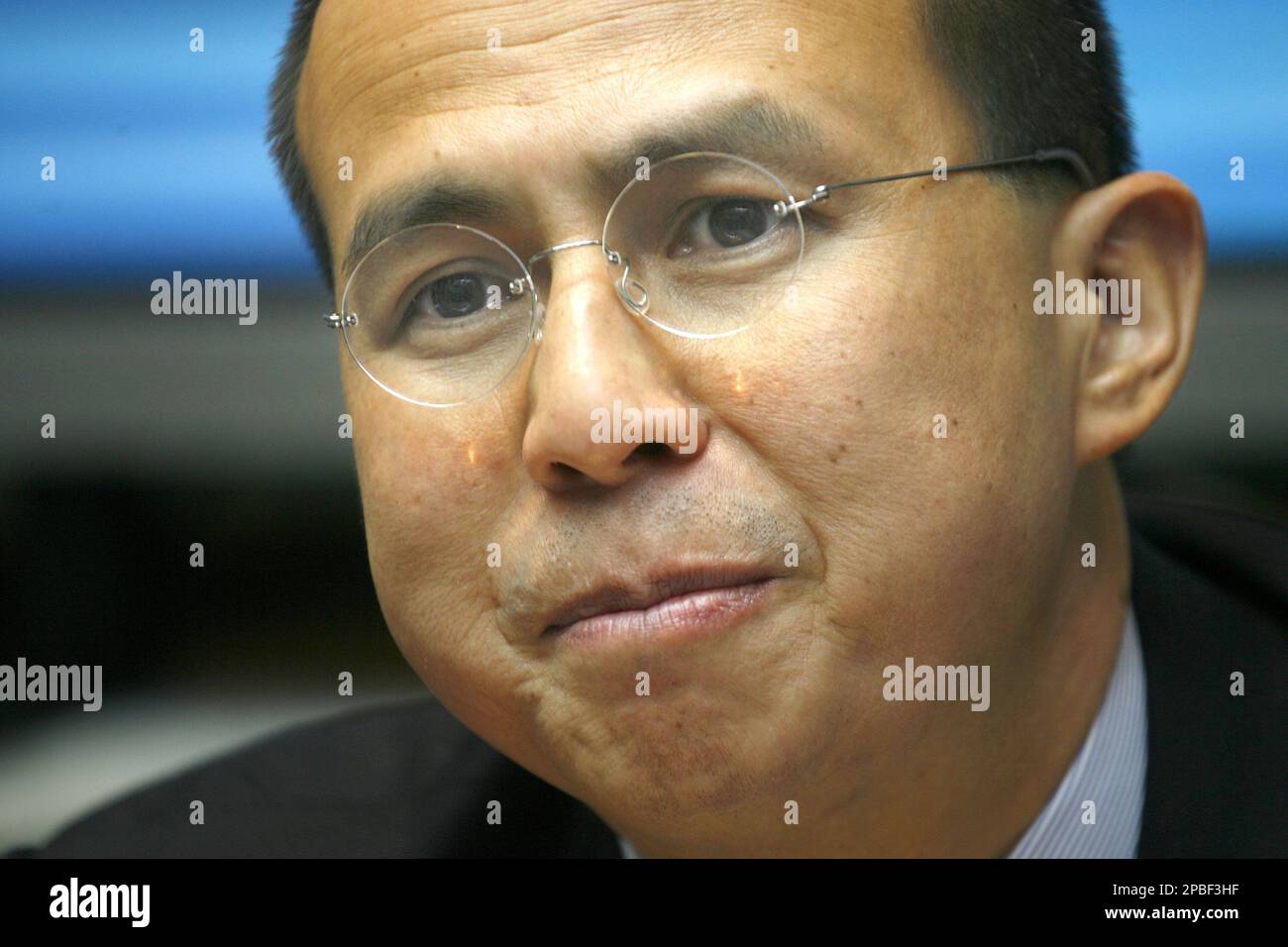 Richard Li, chairman of PCCW Ltd. talks during a press conference after ...