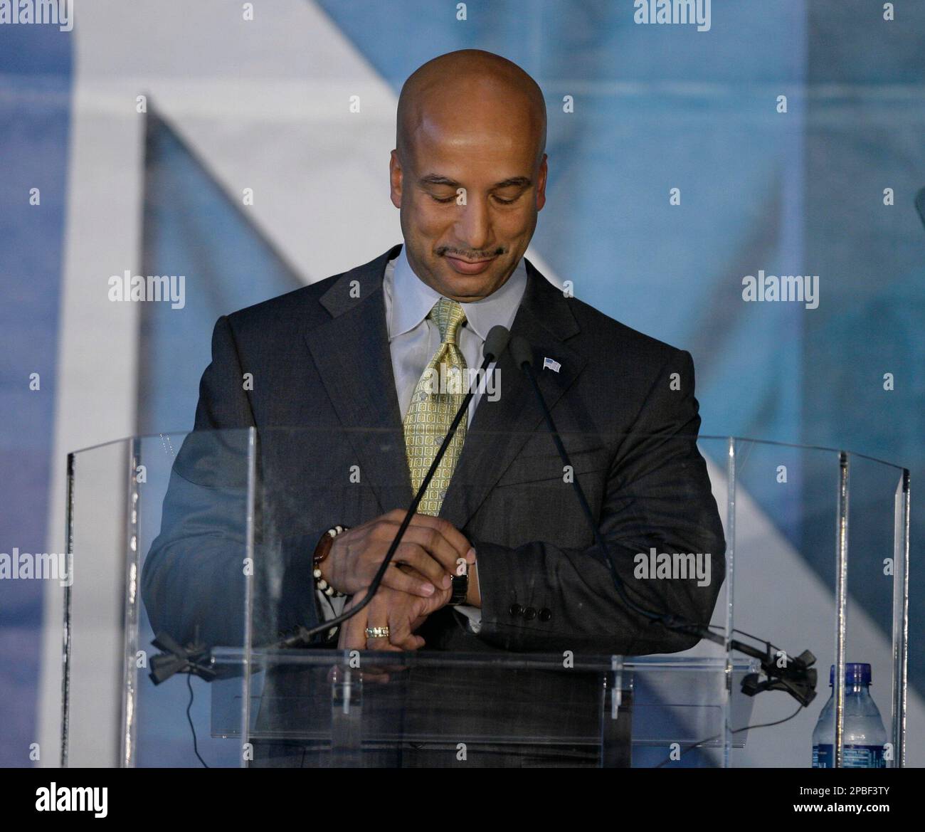 New Orleans Mayor Ray Nagin checks his watch before beginning his state ...