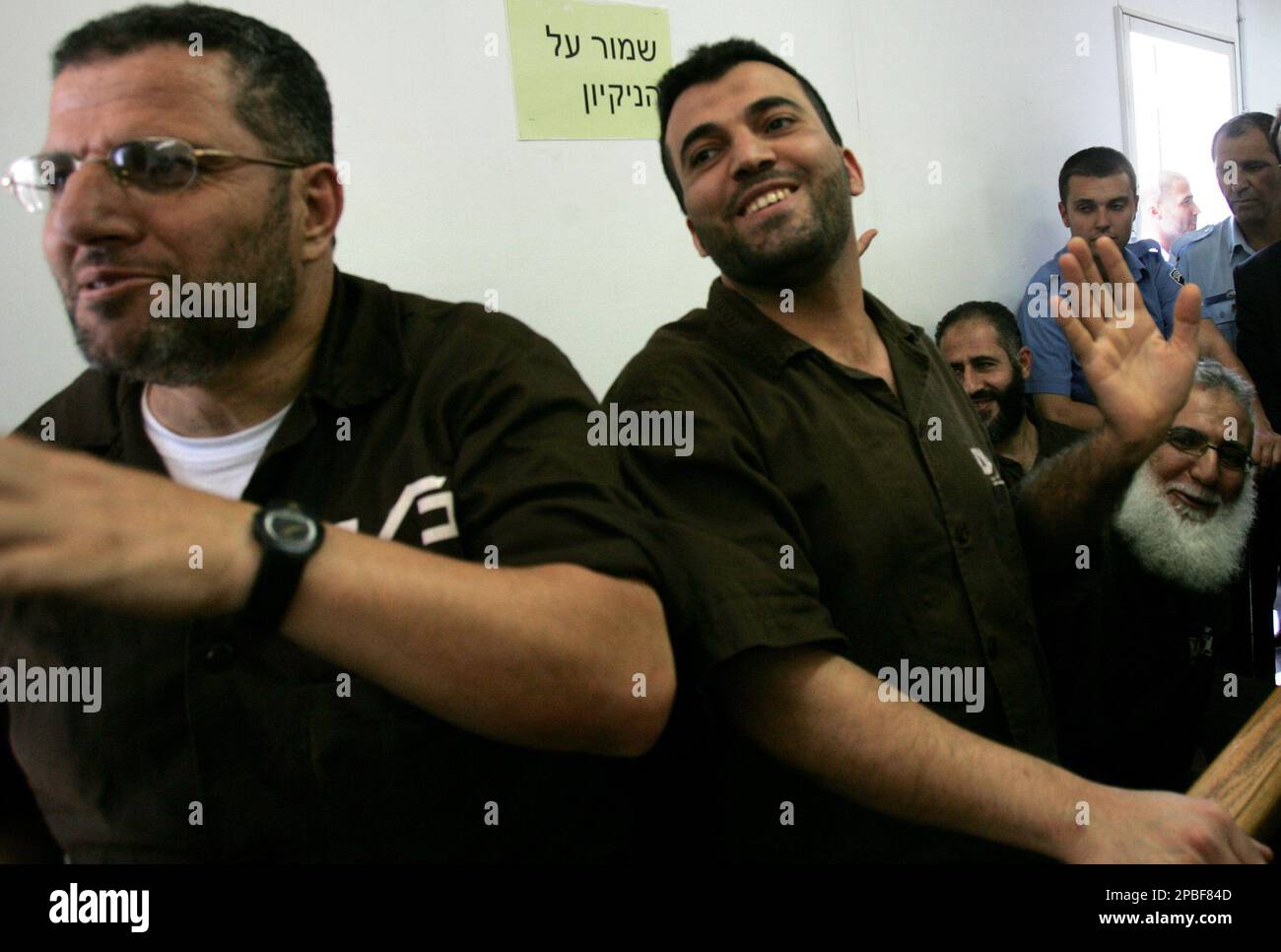 Palestinian Hamas lawmakers, from left to right, Mahmoud Ramahay ...