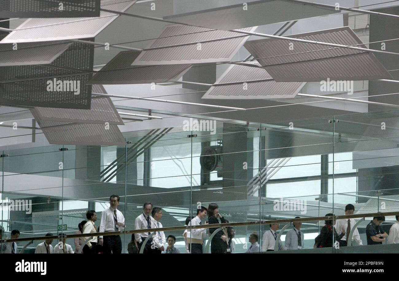 People walk in the newly-completed section of Singapore's Changi ...