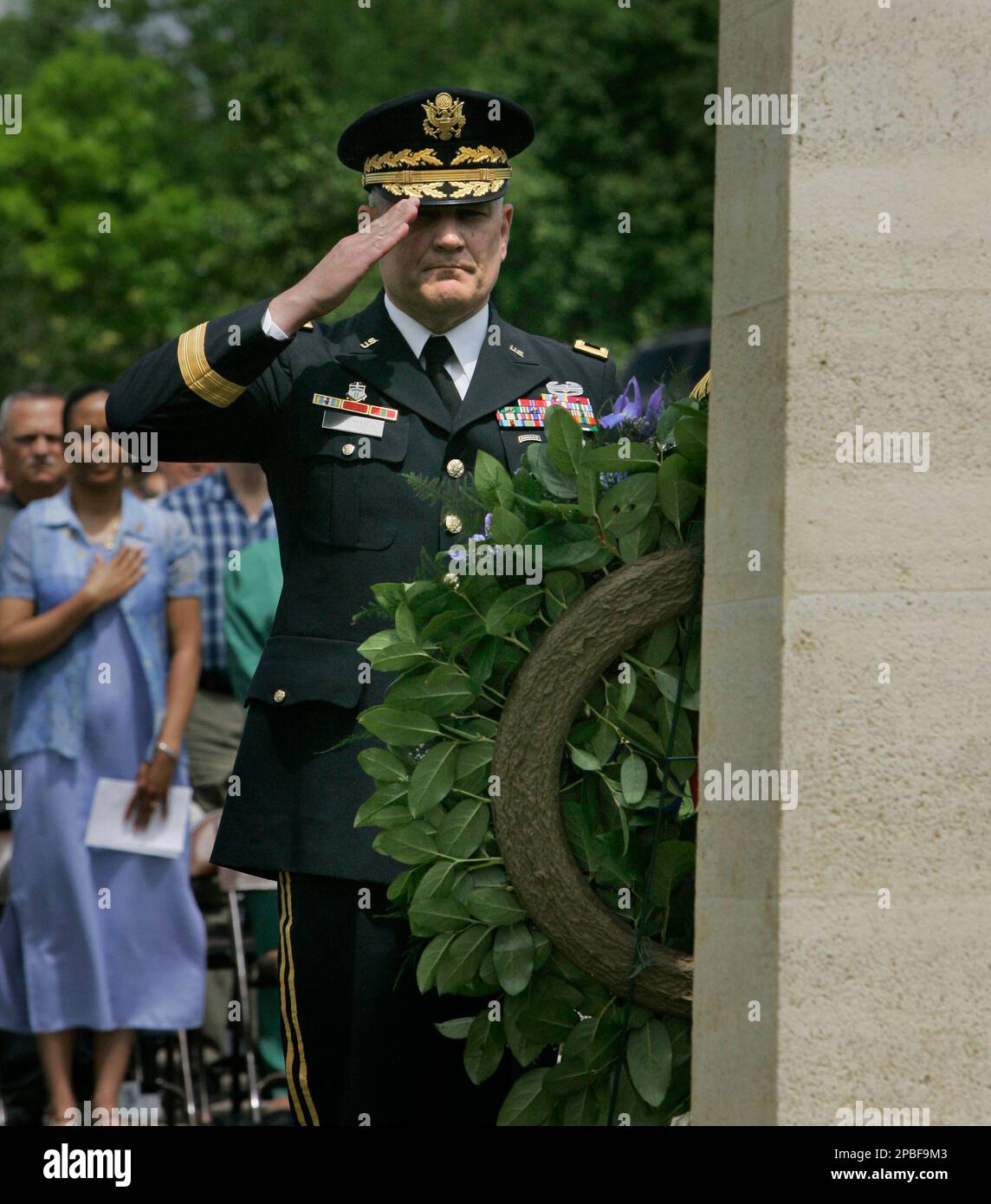 Maj. Gen. Carter Ham salutes during Memorial Day ceremonies at Fort ...