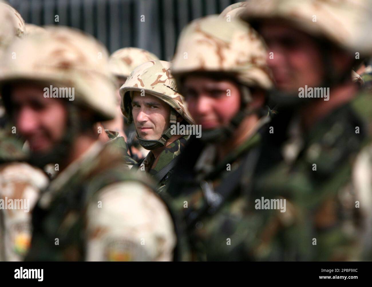 Bulgarian army soldiers attend a send-off ceremony in the military base ...