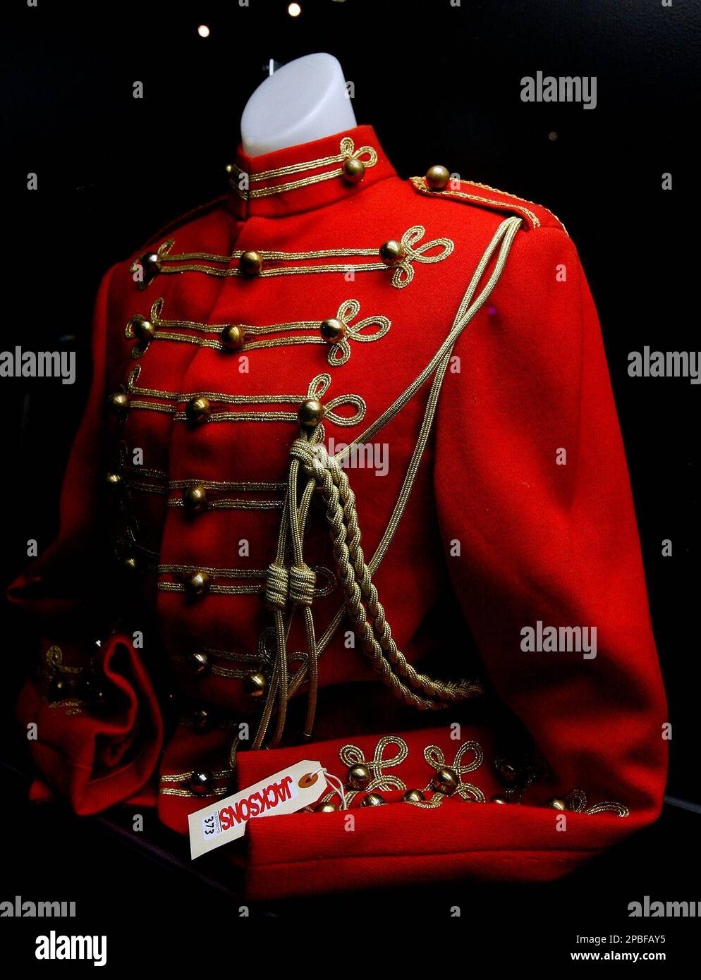 Michael Jackson's Bill Whitten red and gold coat is on display at the ...