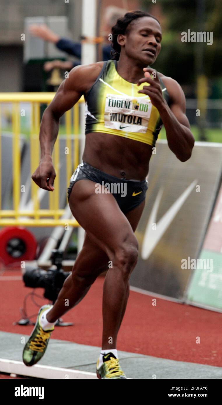 Maria Mutola, from Mozambique, hits the bell lap on her way to winning ...