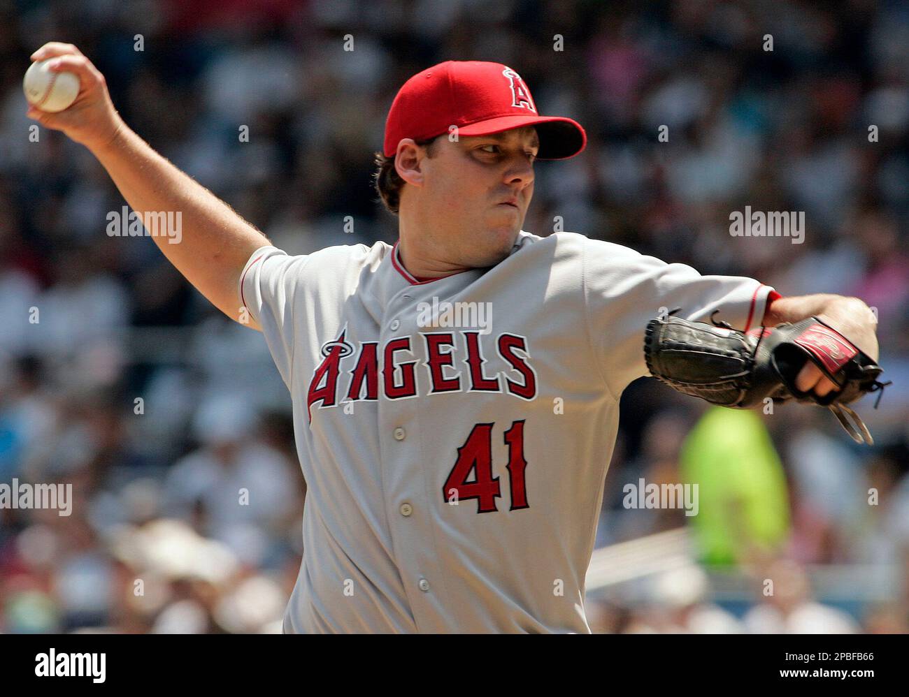 Los Angeles Angel's John Lackey delivers a pitch to a New York Yankees ...
