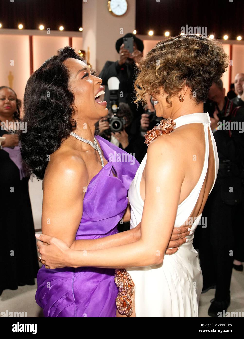 Angela Bassett, left, and Halle Berry arrive at the Oscars on Sunday ...