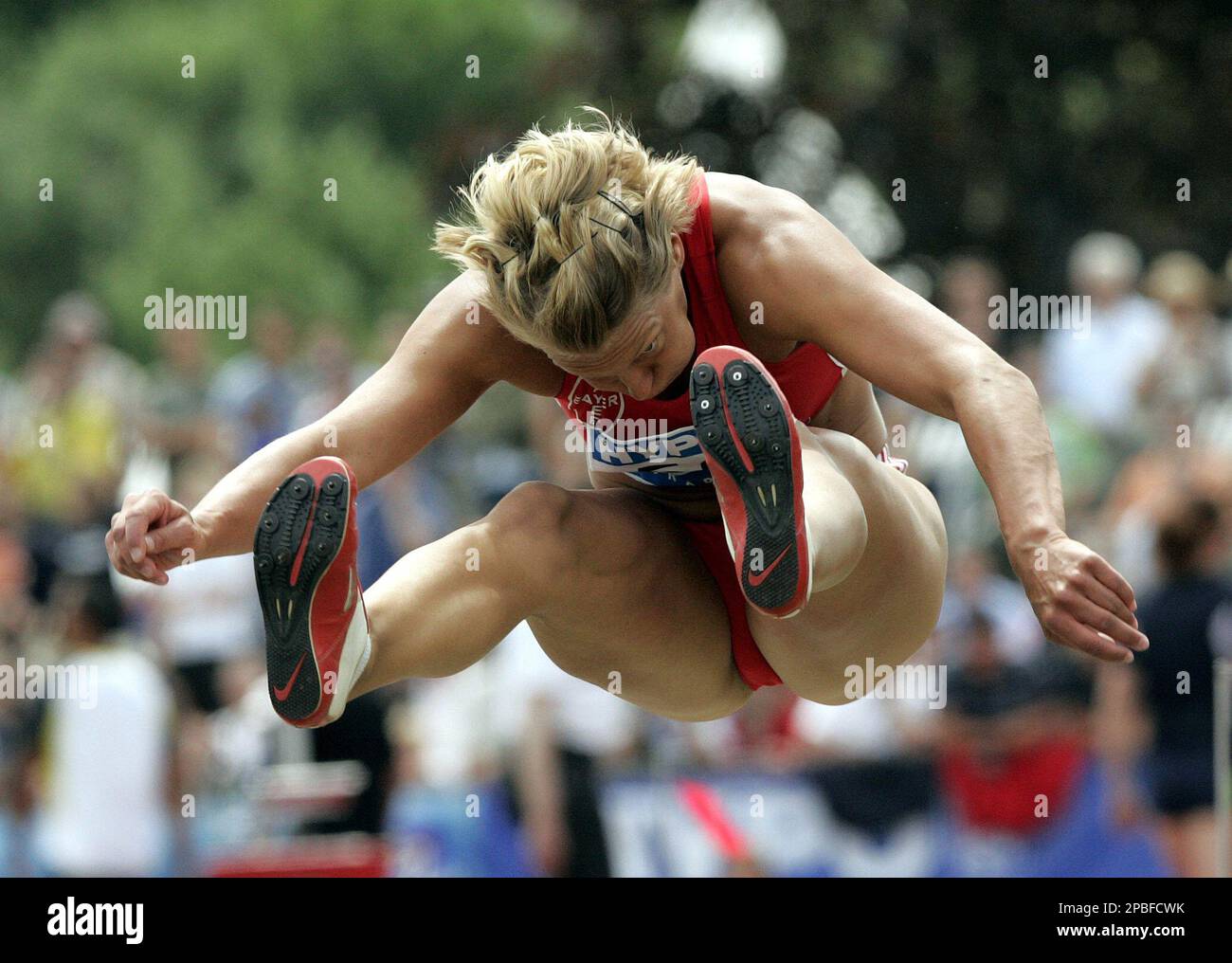 Germany's Jennifer Oeser makes an attempt in the long jump competition ...