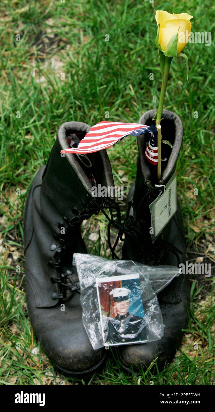 A pair of U.S. military boots representing the life of Marine Cpl ...