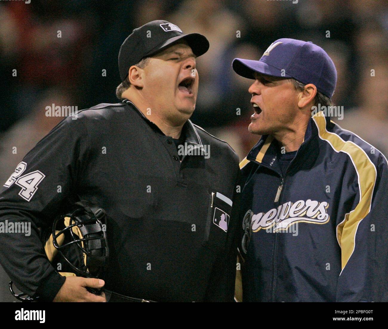 Home plate umpire Jerry Layne argues with Milwaukee Brewers manager Ned ...