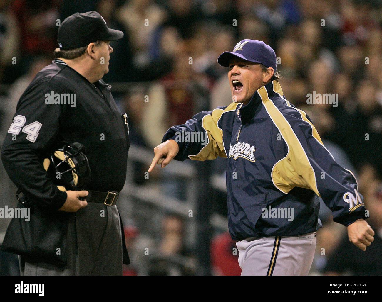 Milwaukee Brewers manager Ned Yost argues with home plate umpire Jerry ...