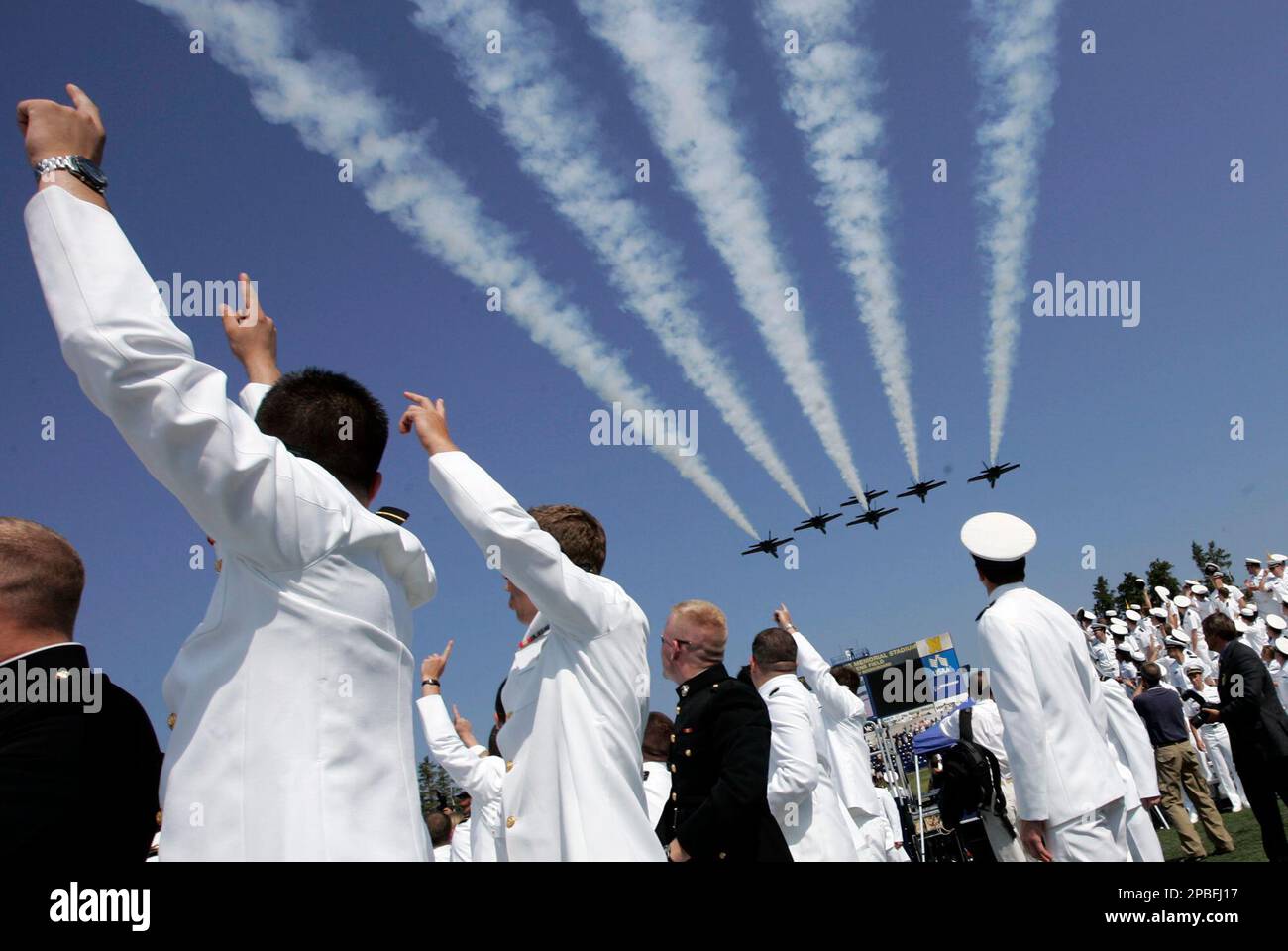 Graduating midshipmen watch as the Blue Angels fly over Marine Corps ...
