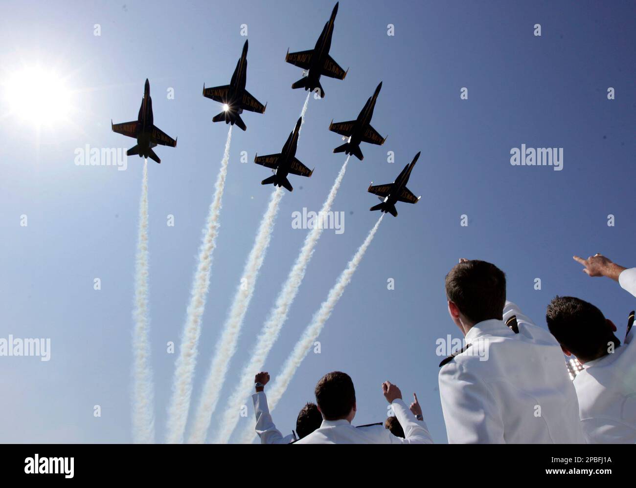 Graduating midshipmen watch as the Blue Angels fly over Marine Corps ...