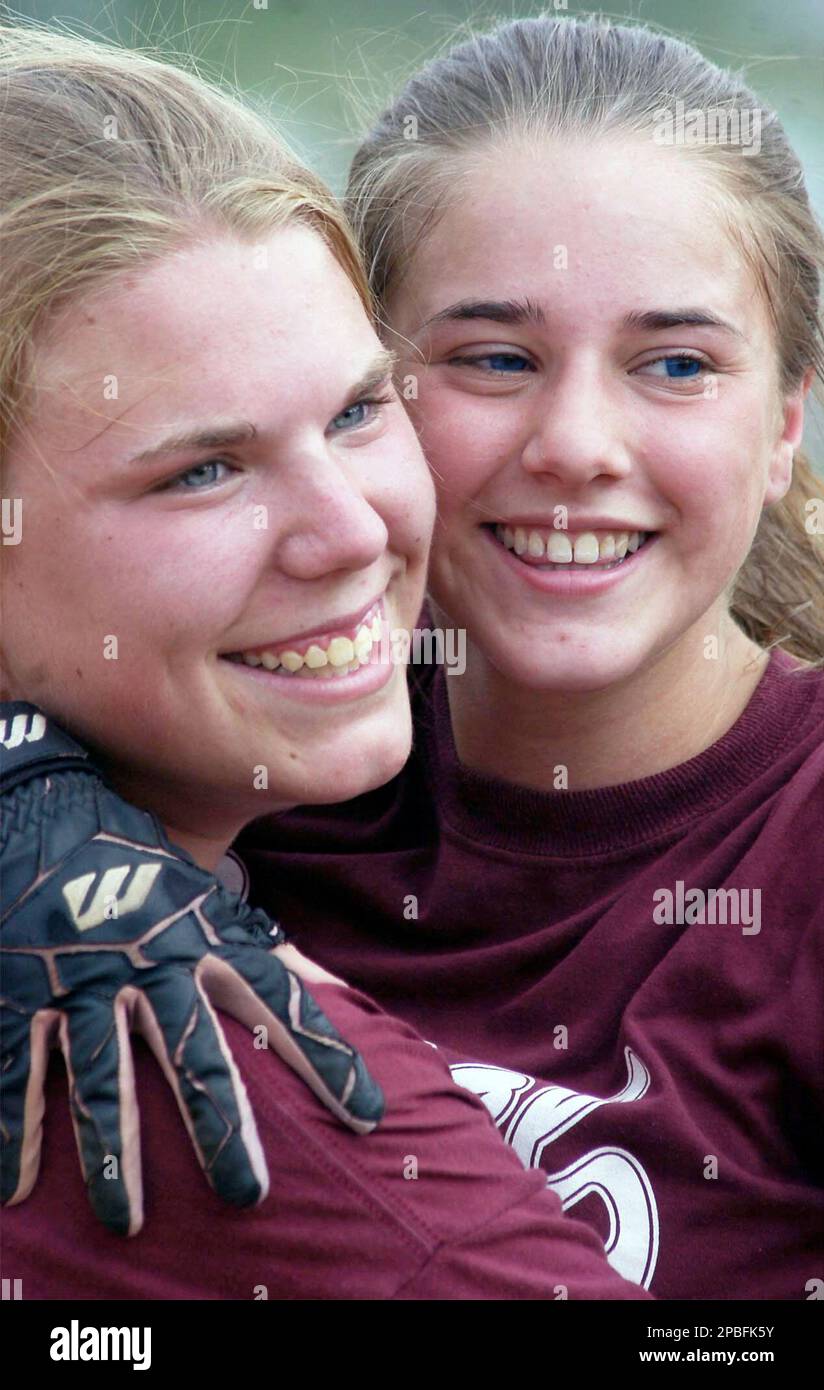 Wheeling Central's Brittany Derr, right, and Steph Barry share an ...