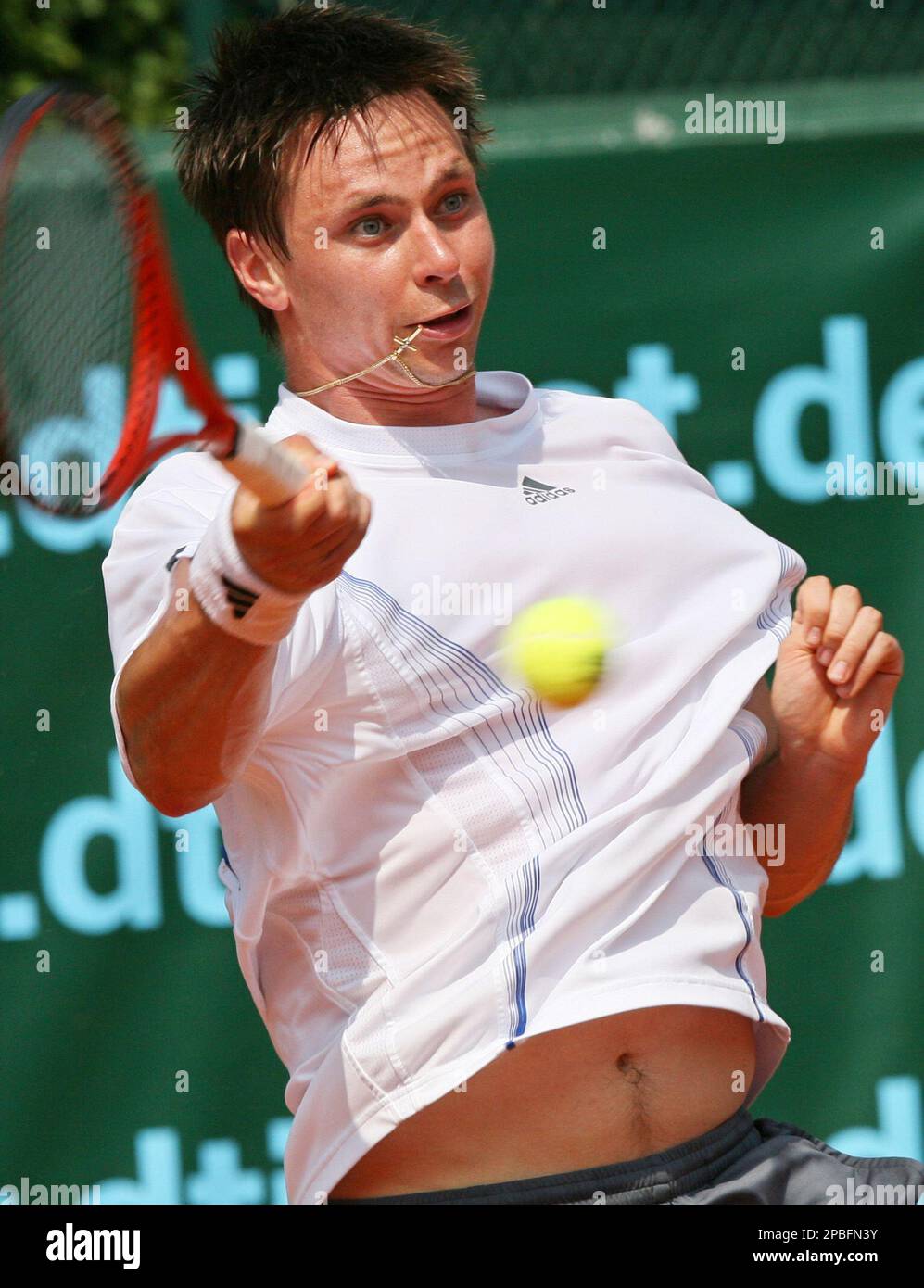 Robin Soderling from Sweden returns the ball to US player James Blake ...