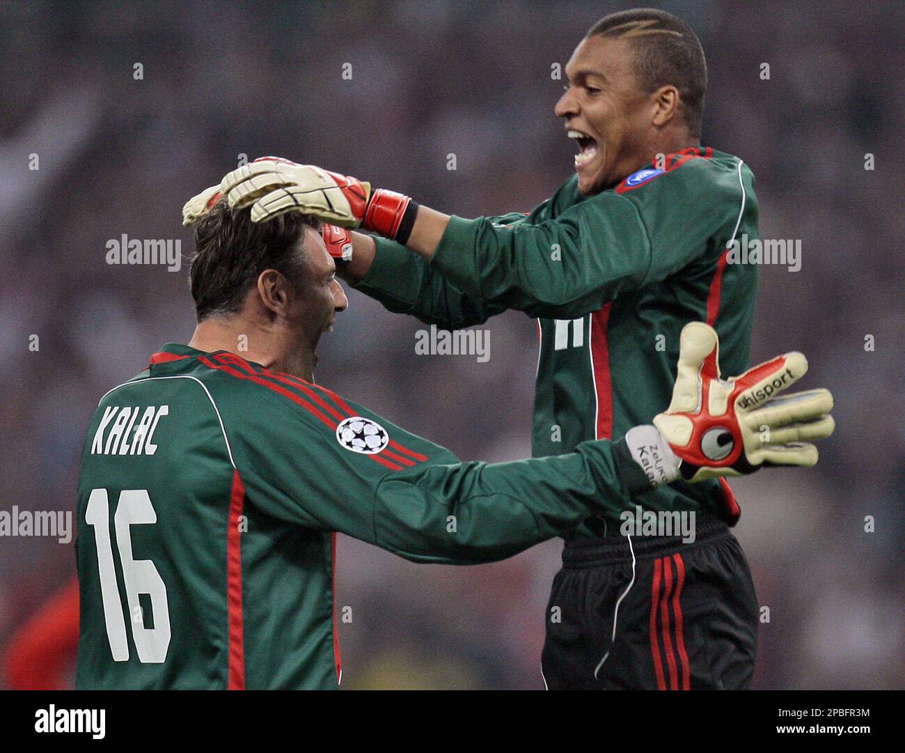 AC Milan's goalkeeper Dida, right, celebrates with his reserve Zeljko ...