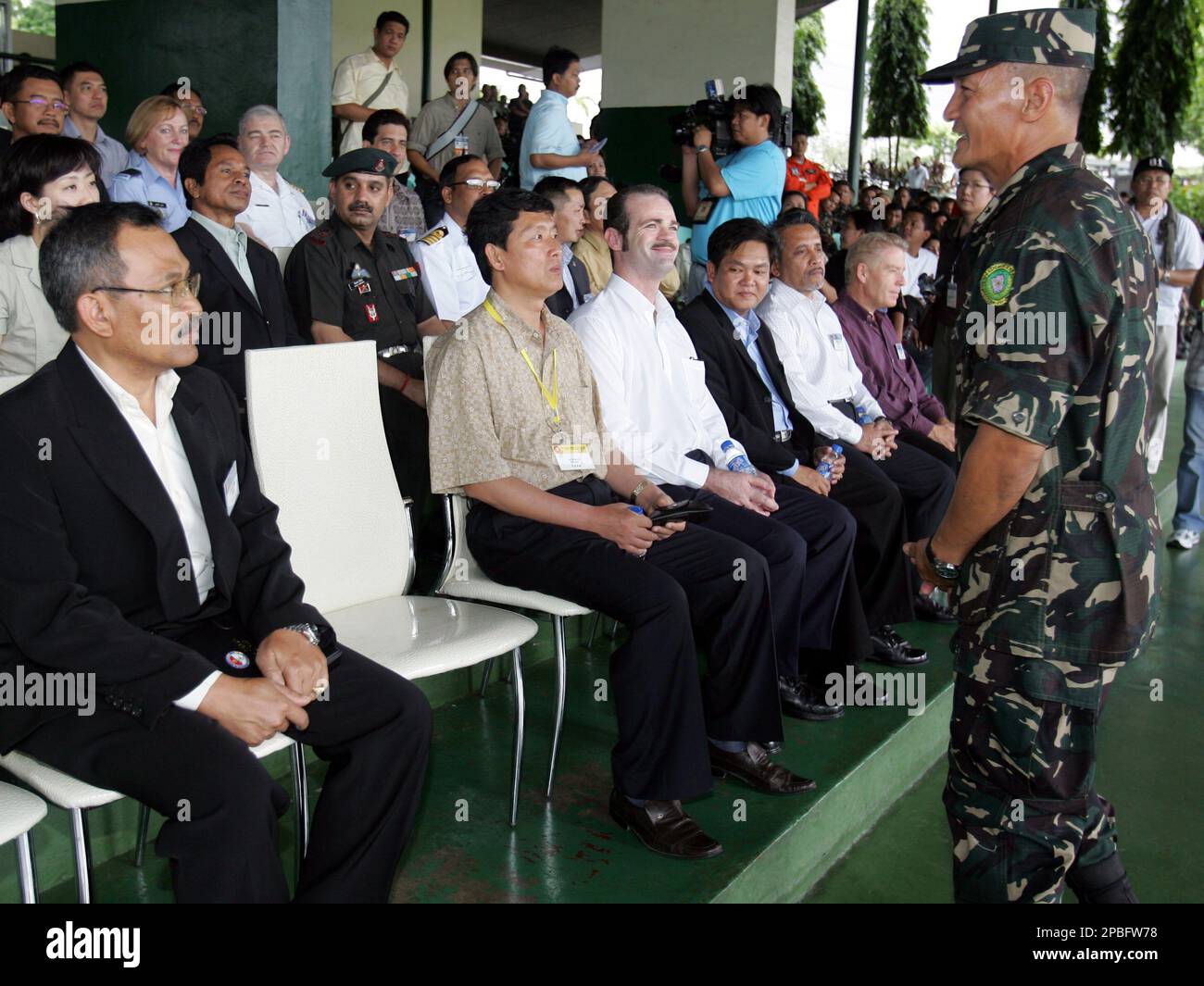 Filipino Brigadier General Ricardo Morales, right, talks to senior ...