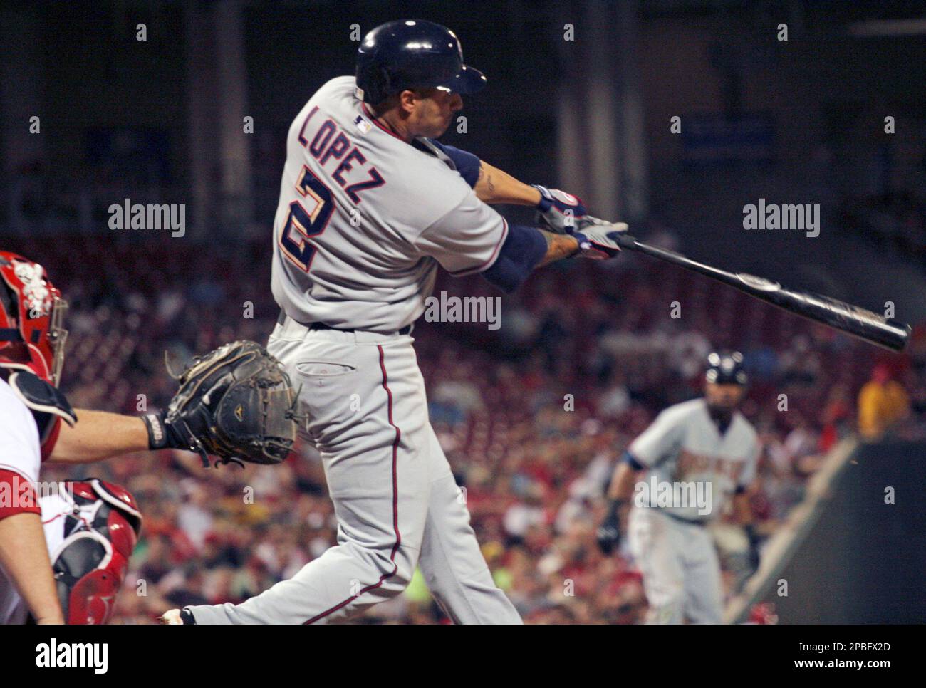 Washington Nationals' Felipe Lopez (2) hits a grand slam off Cincinnati ...