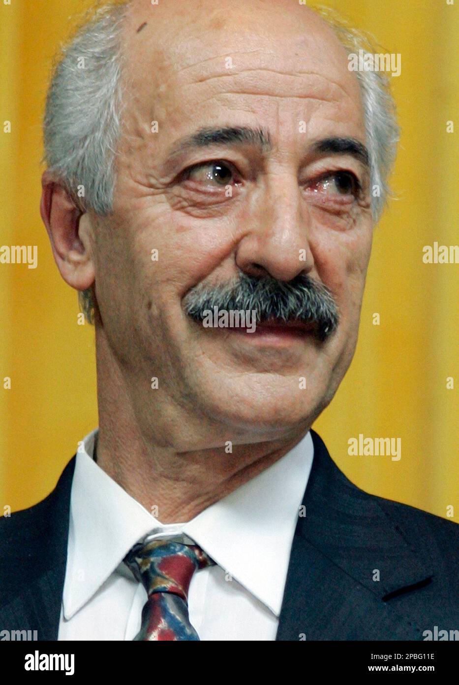 Tears well in the eyes of Jahangir Razmi, an Iranian photographer who ...