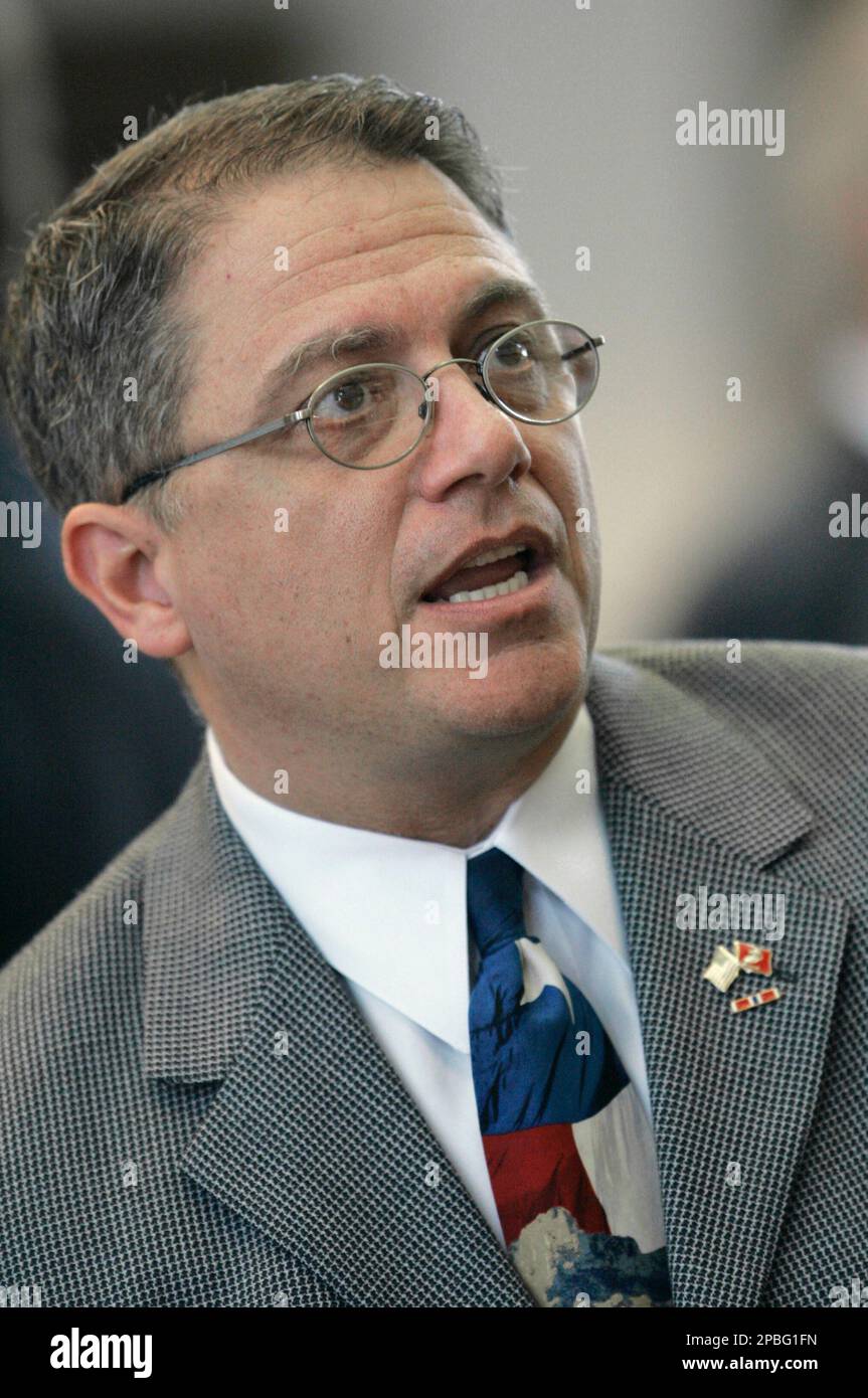 Rep. Frank Corte, R-San Antonio, talks with a friend during a break in ...