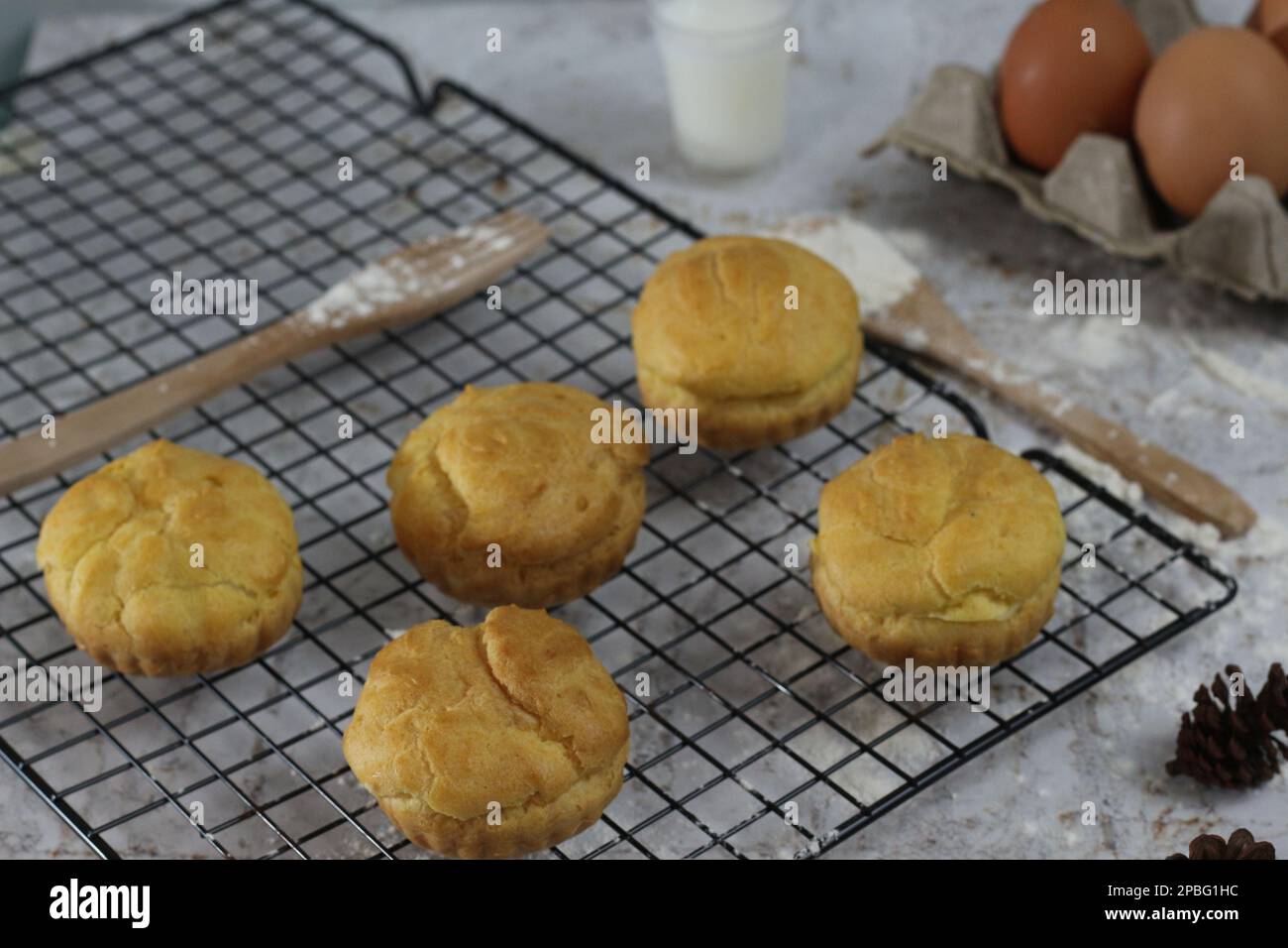 a traditional cake from Indonesia called kue sus filled with cream ...
