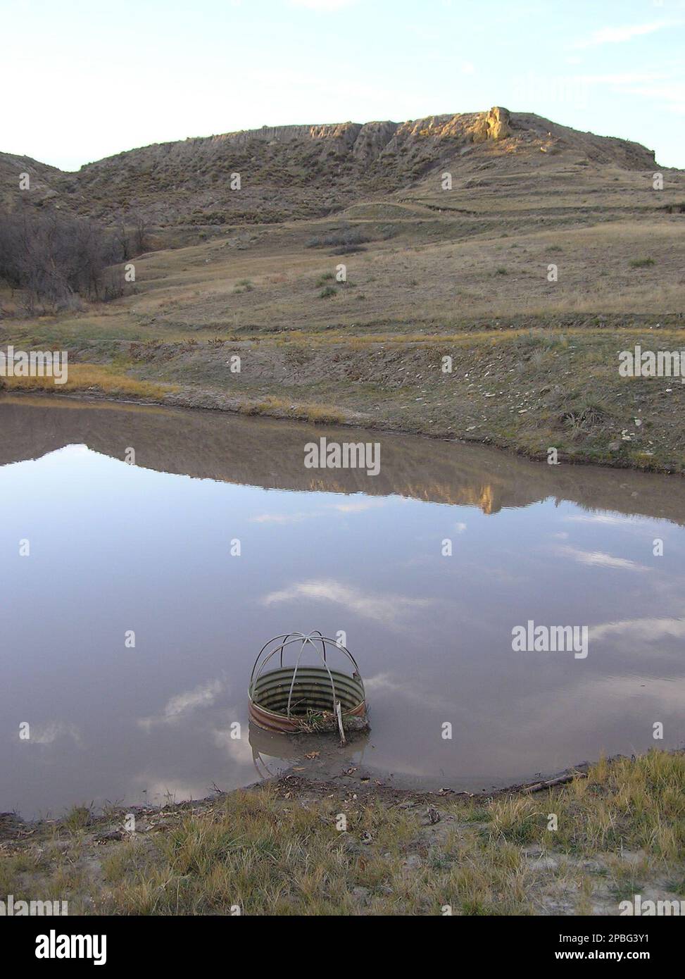 A sediment pit holds runoff from old uranium mines at Ludlow, S.D., on ...