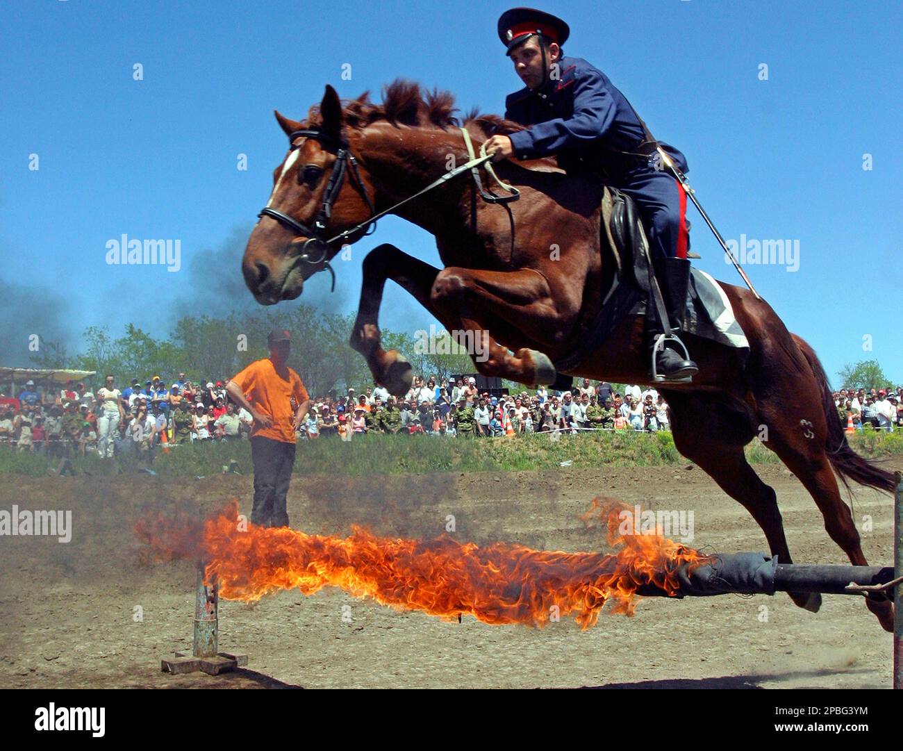 A rider wearing 1910's-era Don Cossacks' military uniform performs ...