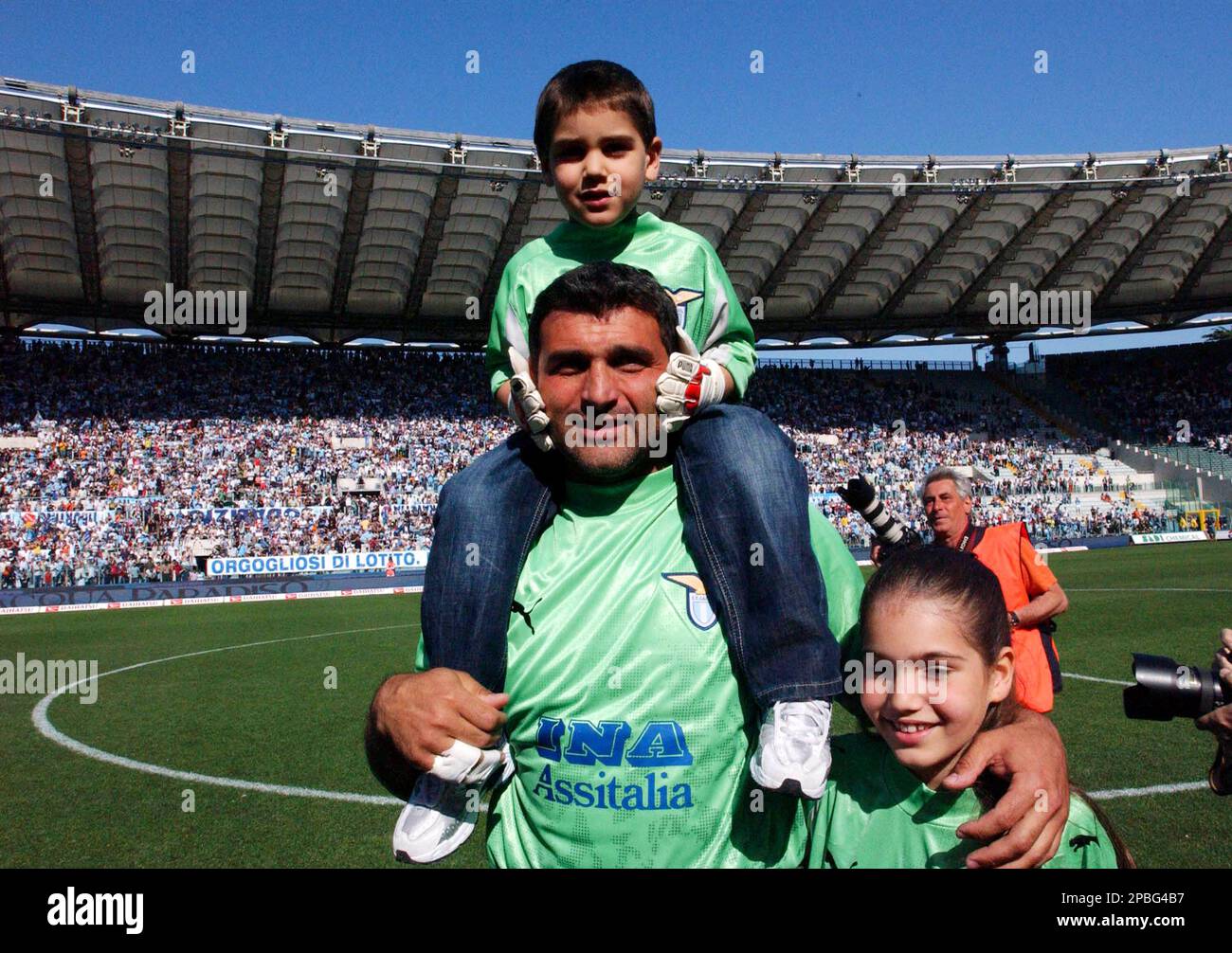 Lazio's goalkeeper Angelo Peruzzi carries his son on shoulder at the ...