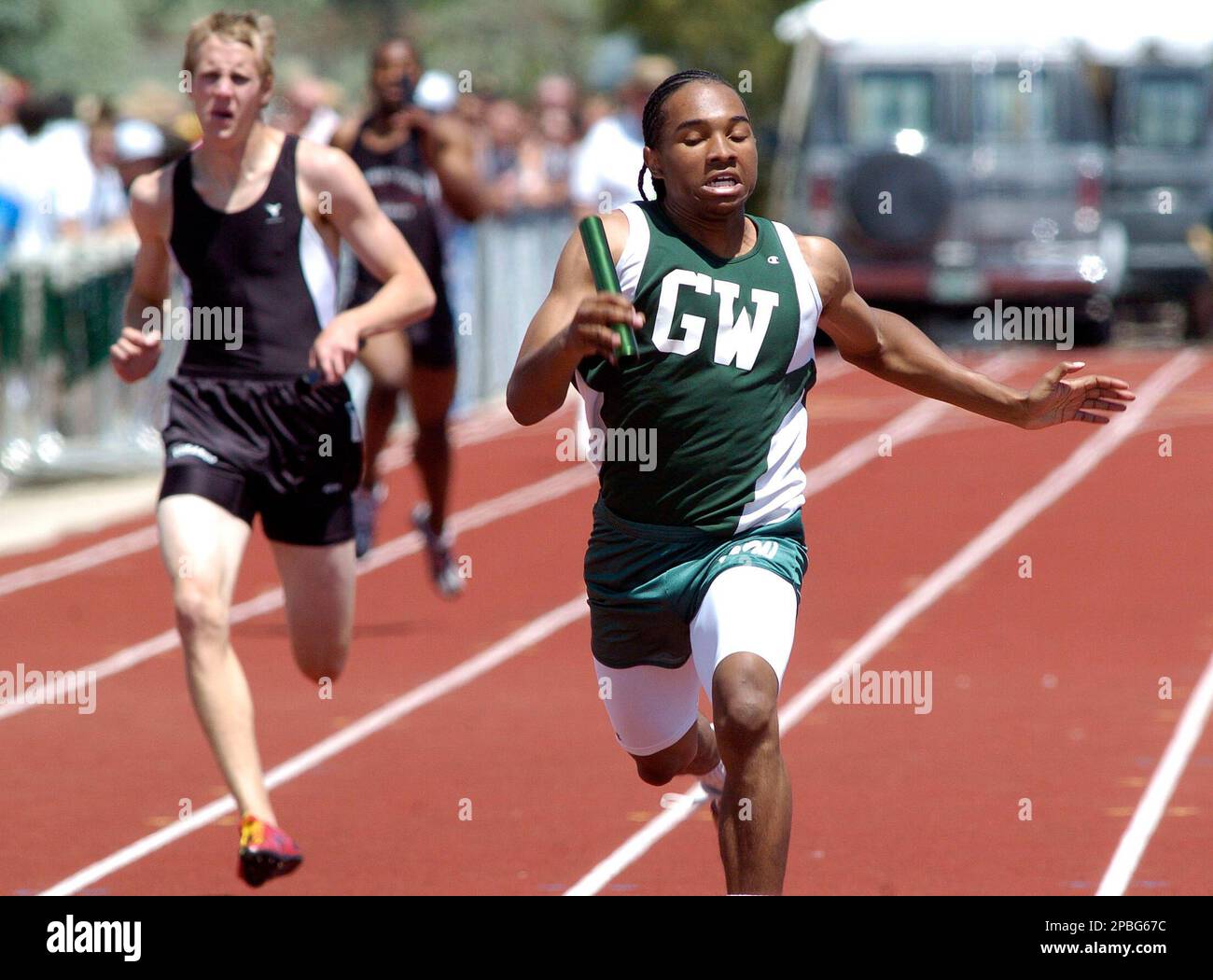 George Washington anchor A.J. Whitaker approaches the finish, as the ...