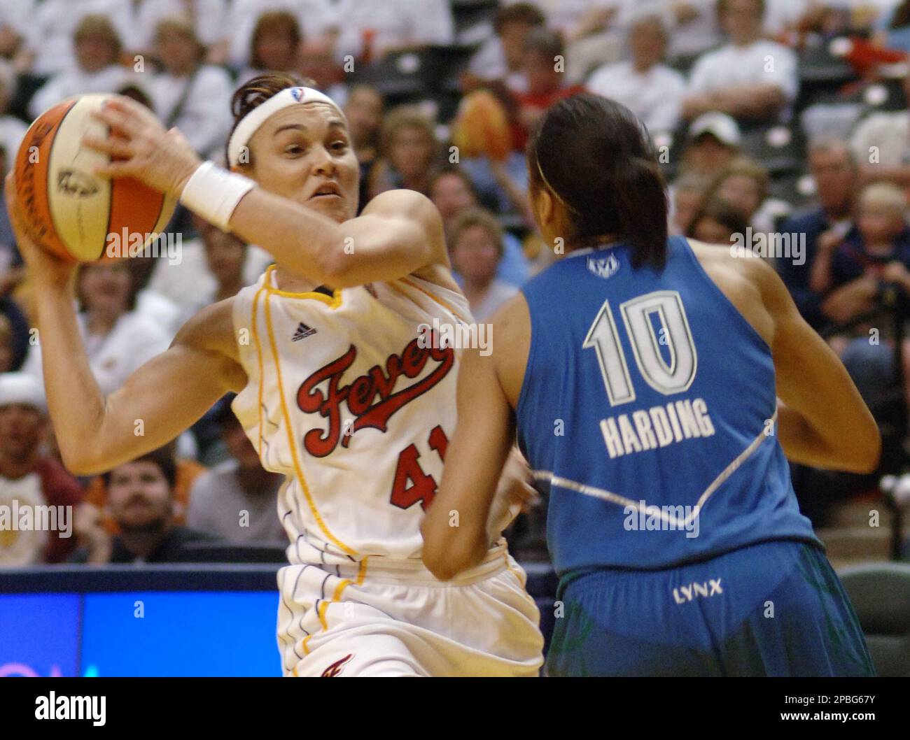 Minnesota Lynx's Lindsey Harding (10) defends Indiana Fever's Tully ...