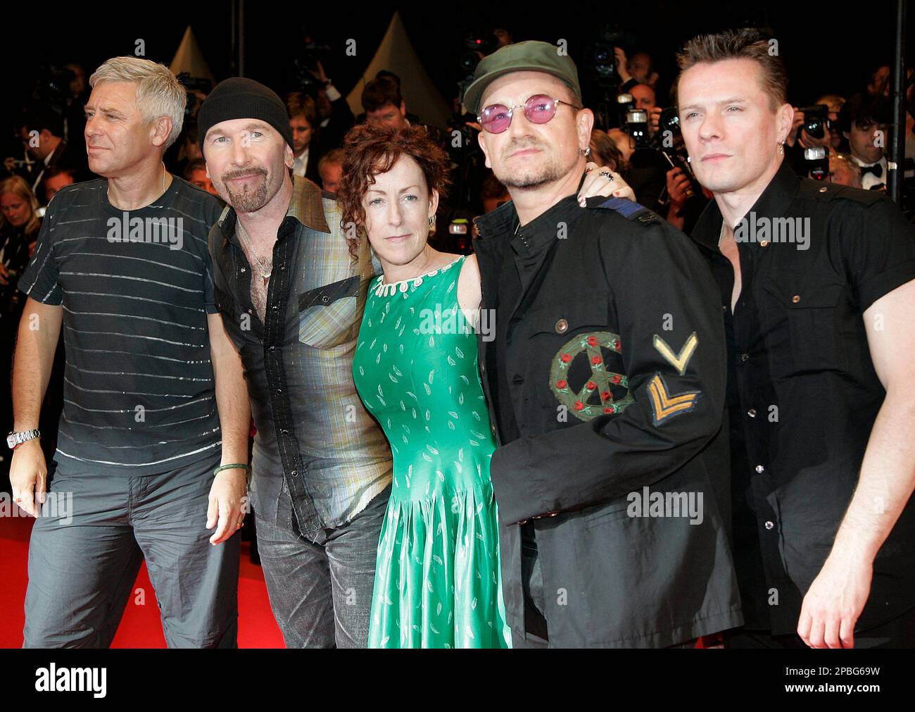 The members of U2, from left, Adam Clayton, The Edge, director ...