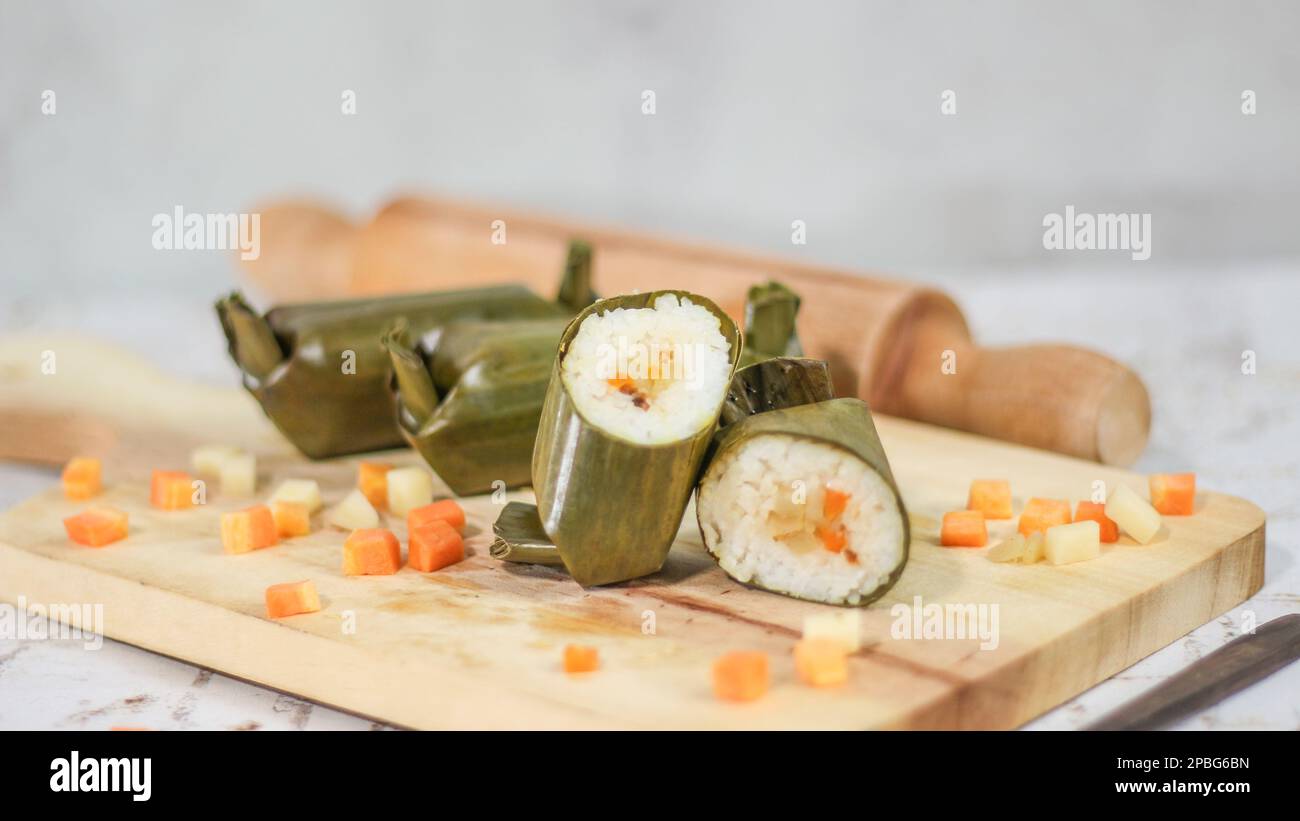 a close up of Lontong. Traditional food from Indonesia originating from ...