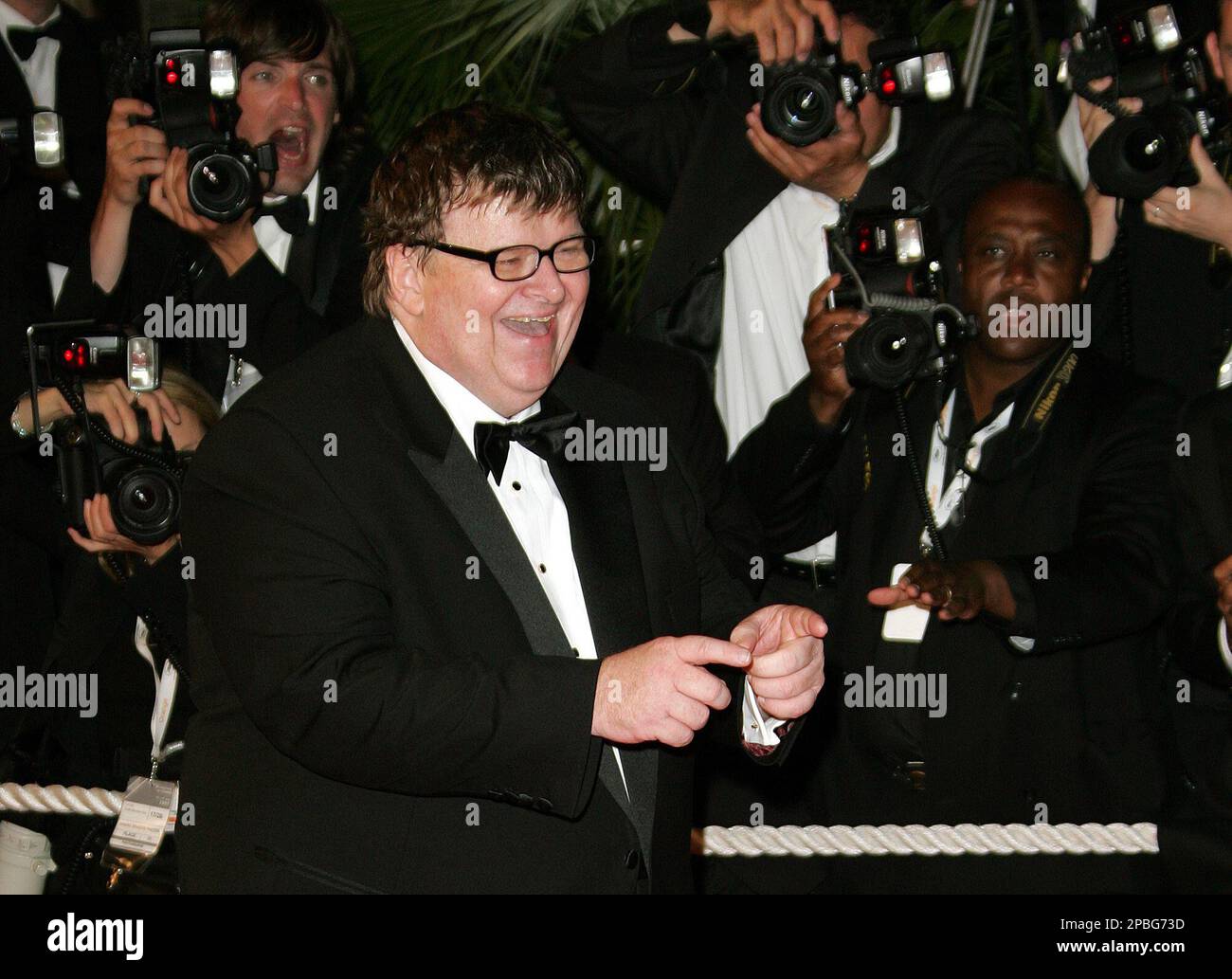 American director Michael Moore arrives for the screening of his film ...