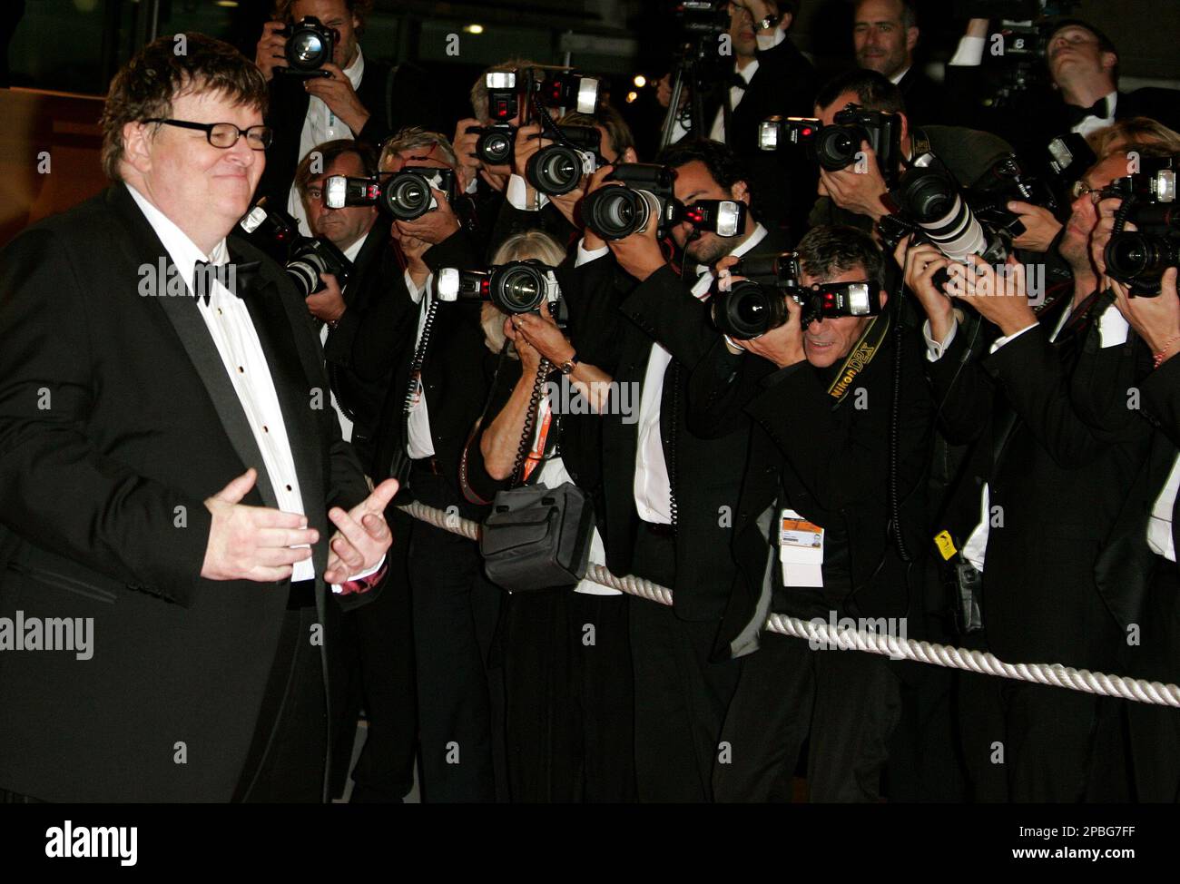 American director Michael Moore arrives for the screening of his film ...