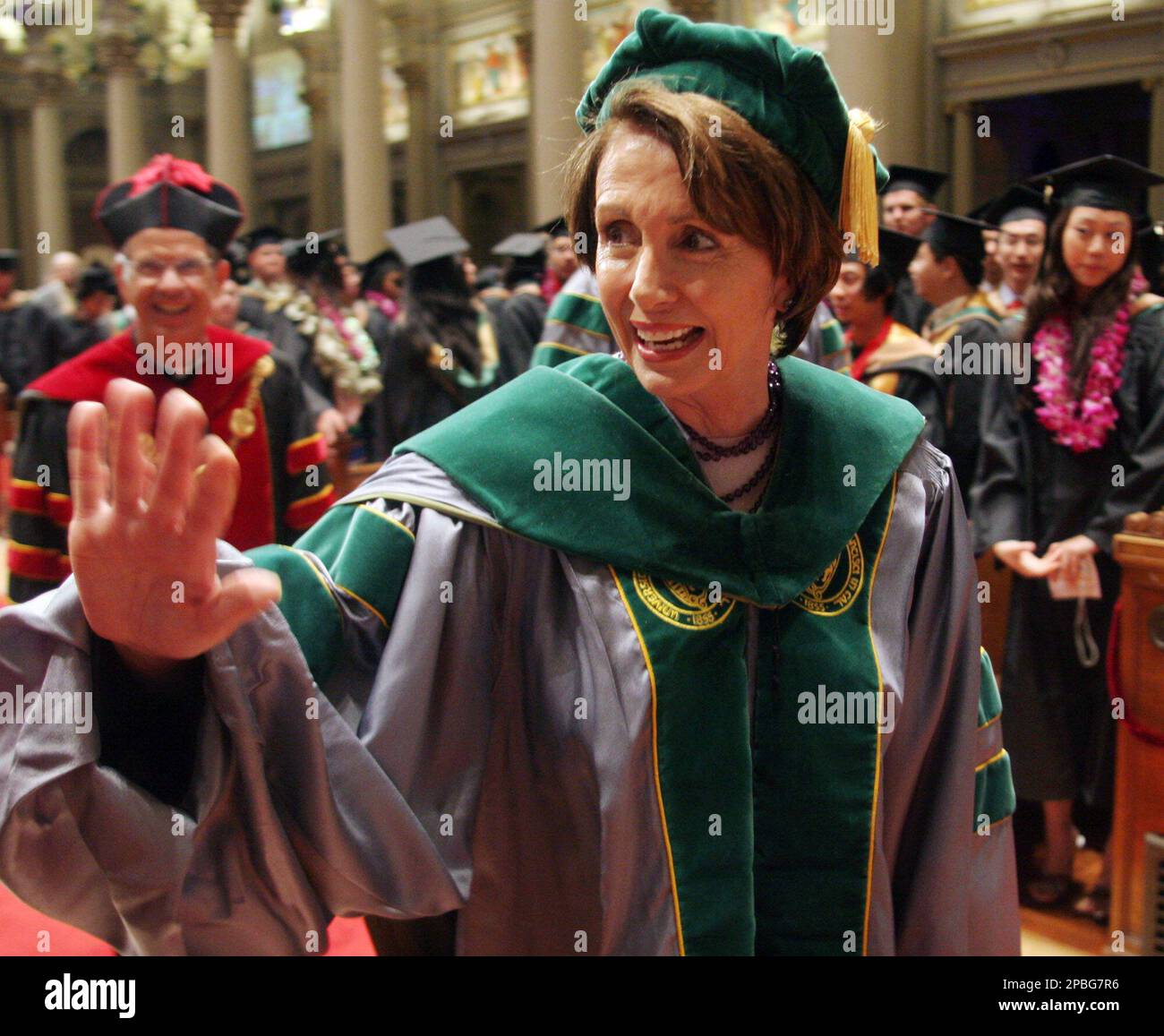 House Speaker Nancy Pelosi waves before the start of commencement ...