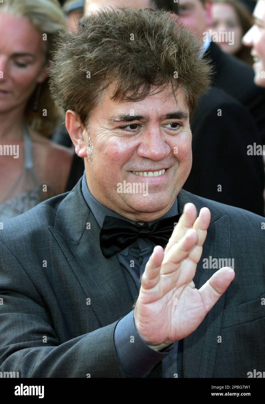 Spanish director Pedro Almodovar waves as he arrives for the screening ...