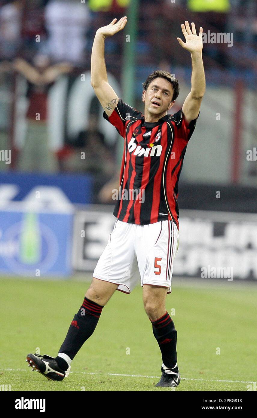 AC Milan's Alessandro Costacurta waves to supporters as he leaves the ...