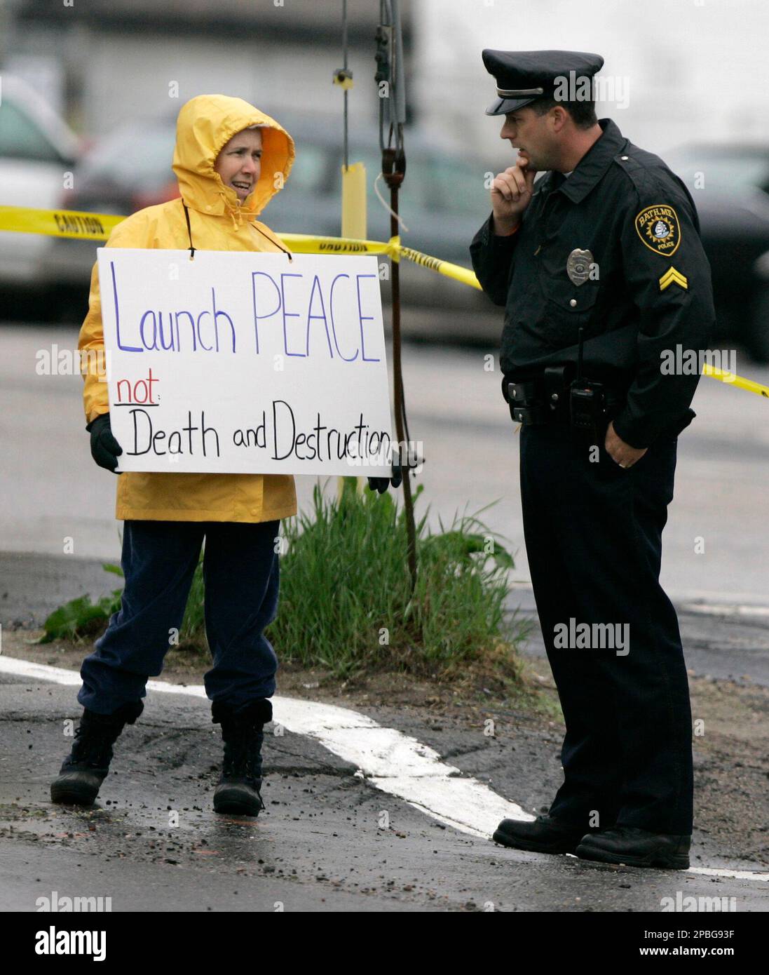 Peace demonstrator Kate Chipman, of Harpswell, Maine, is asked to move across the street from ...