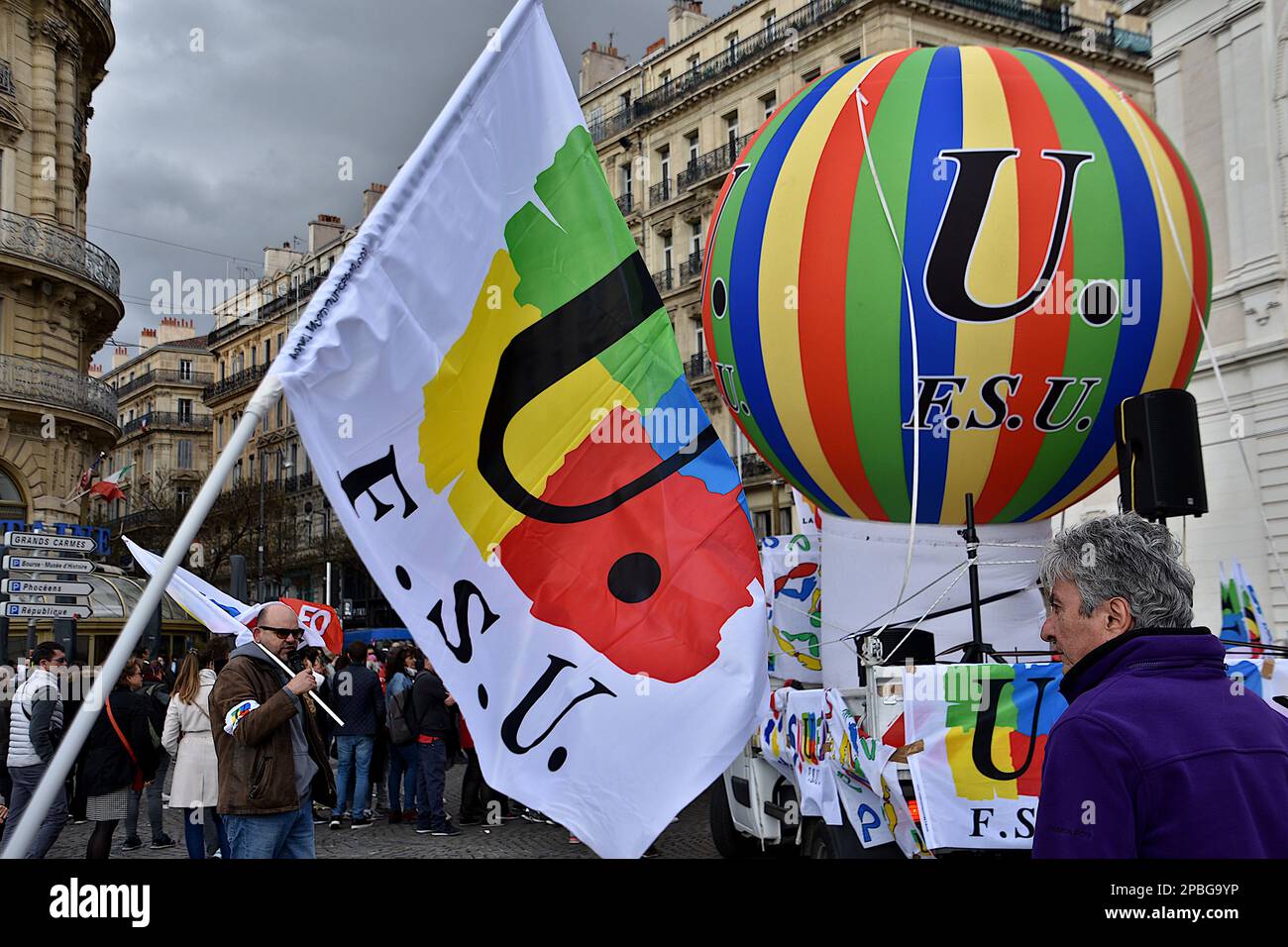 Marseille, France. 11th Mar, 2023. A protester holds a flag during the ...