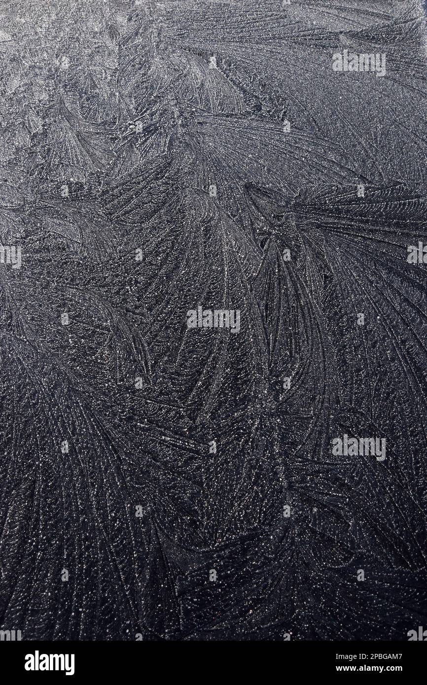 Frost with feather like patterns on the hood of my car in early March ...