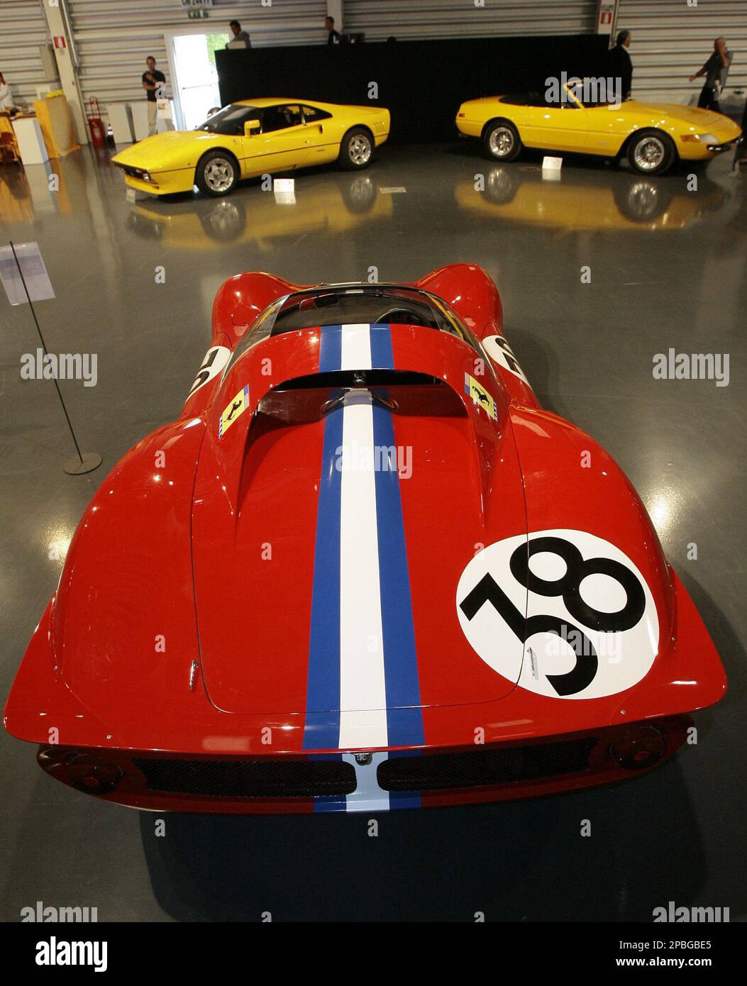 A 1966 Ferrari Dino 206 SP is seen during an auction for 33 of world's ...