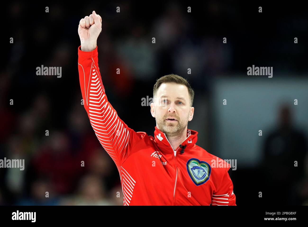 Team Canada's Brad Gushue reacts after making a three against Team ...