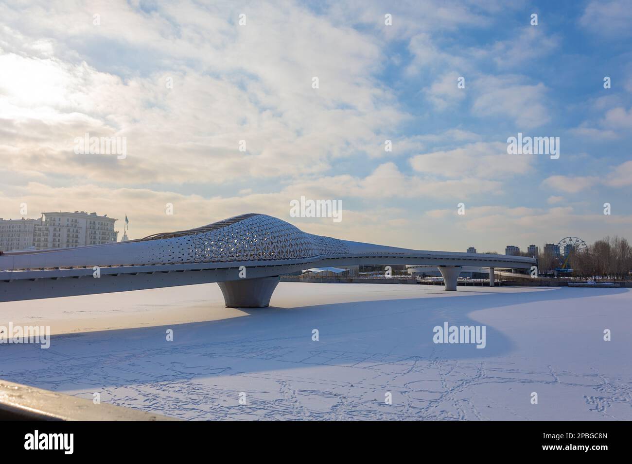 Modern architectural urbanistic Atyrau fish bridge across Ishim river ...