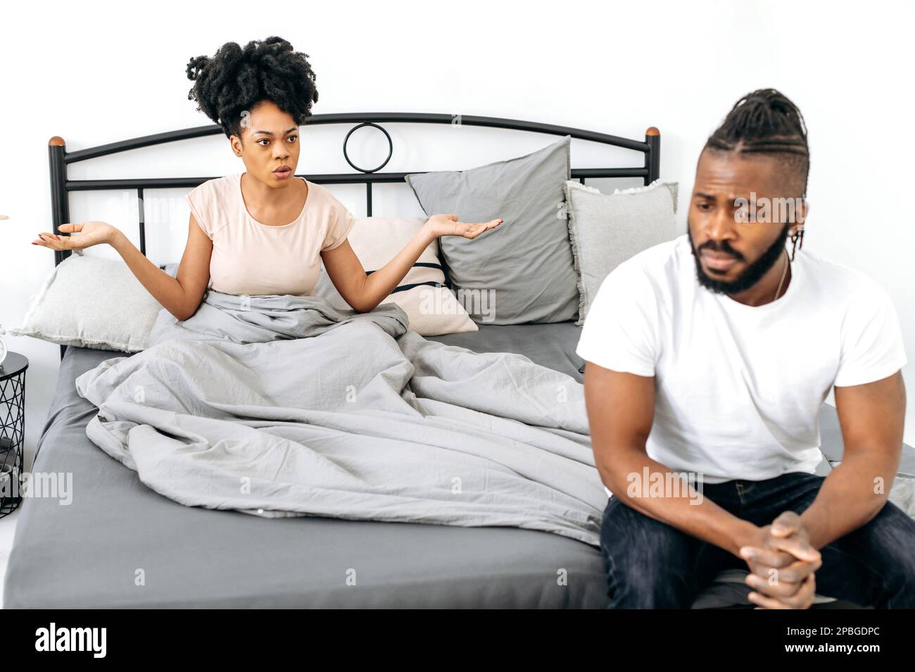 Female jealousy man bed hi-res stock photography and images - Alamy