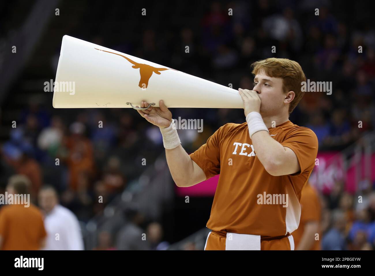 KANSAS CITY, MO - MARCH 10: A Texas Longhorns yell leader holds a ...