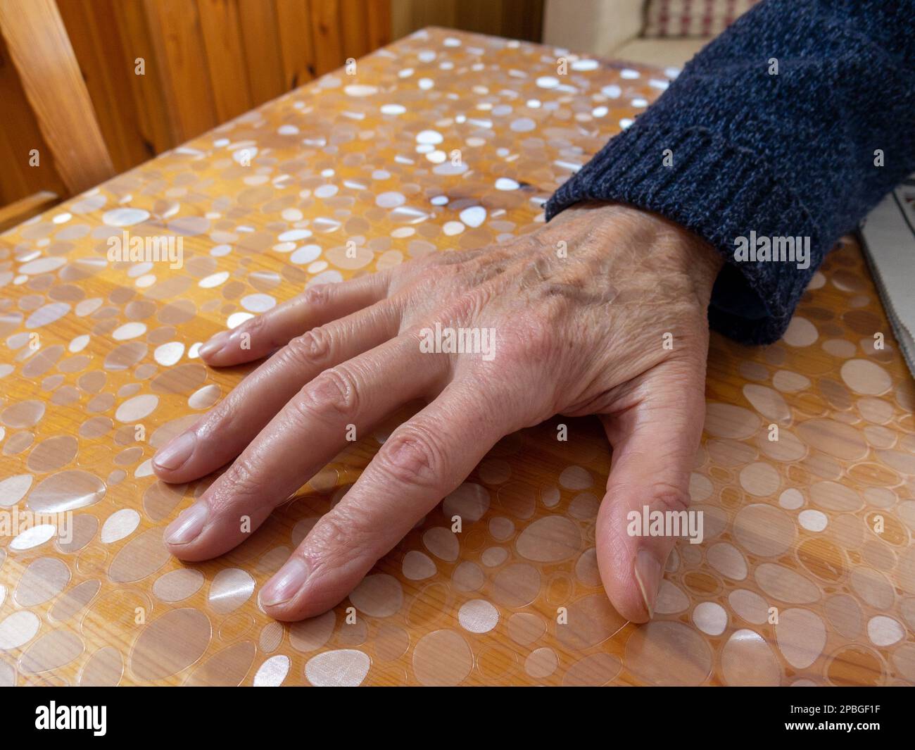 Resting hand on table hi-res stock photography and images - Alamy