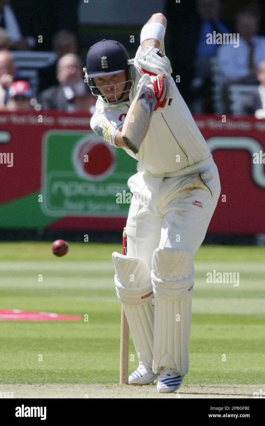 England's Ian Bell drives a ball from West Indian bowler Dwayne Bravo ...