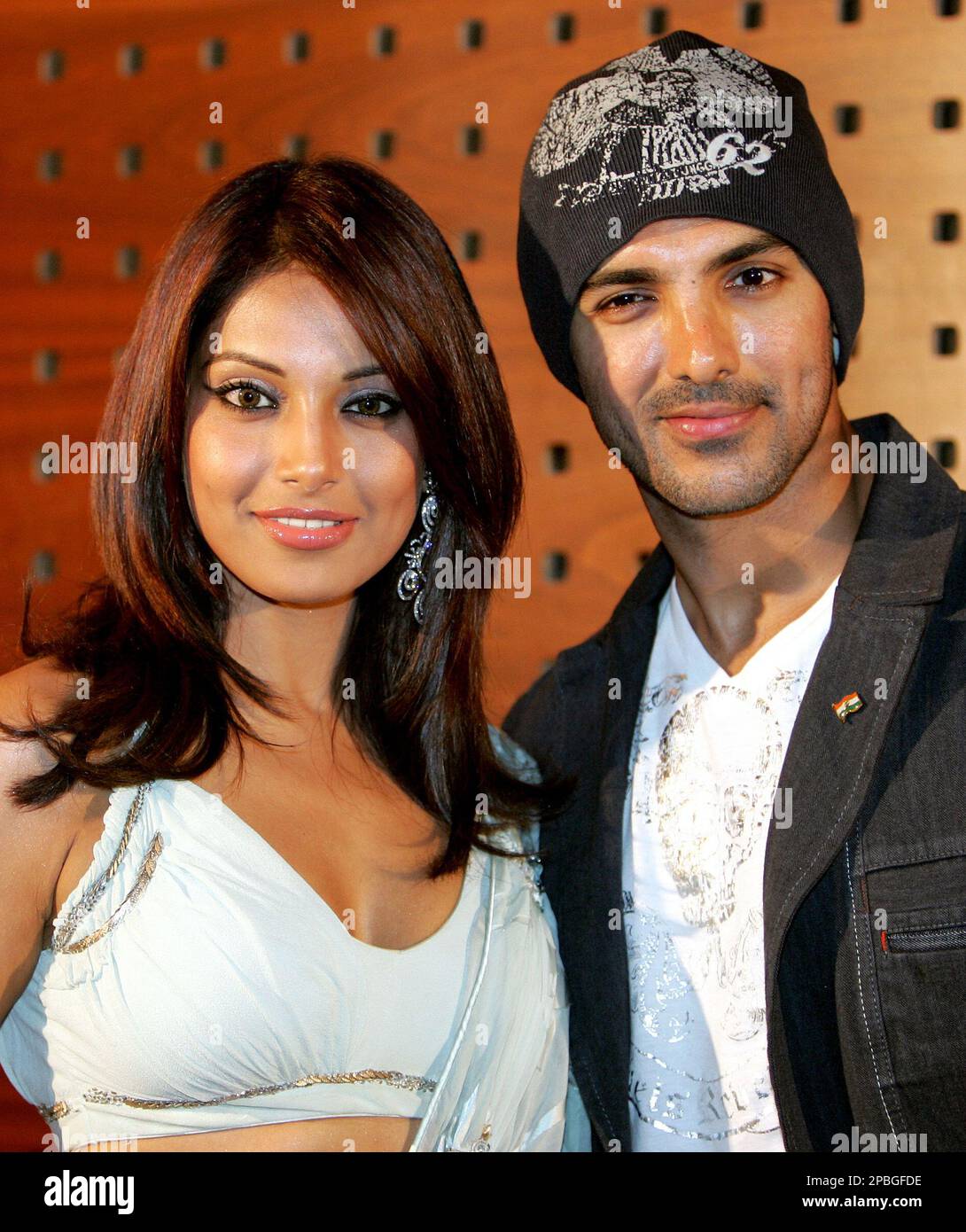Indian actors Bipasha Basu, left, and John Abraham pose during a photo ...