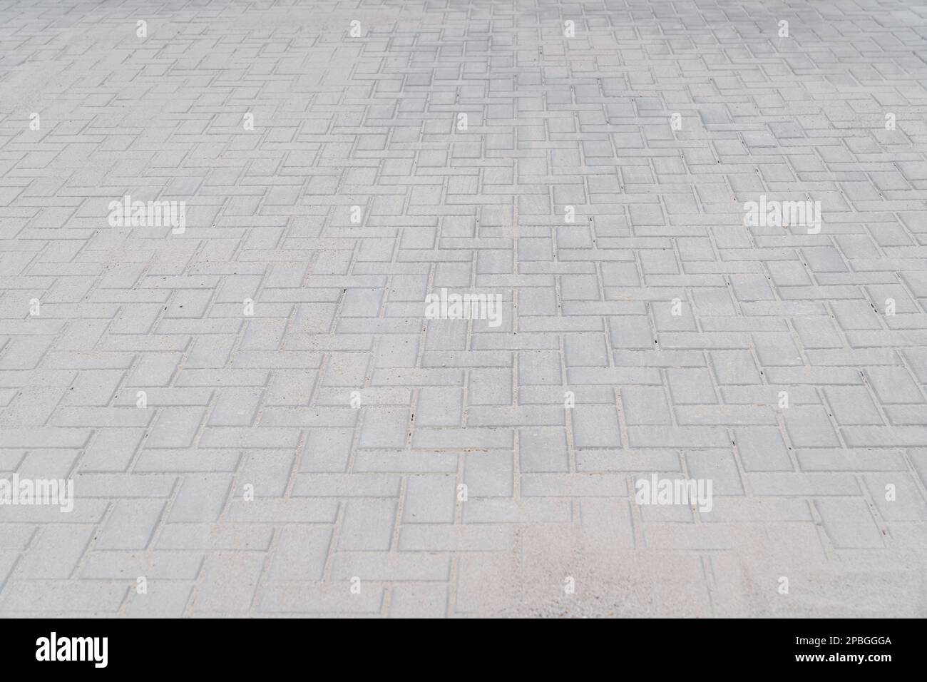 new sidewalk made of concrete interlocking paving blocks Stock Photo ...